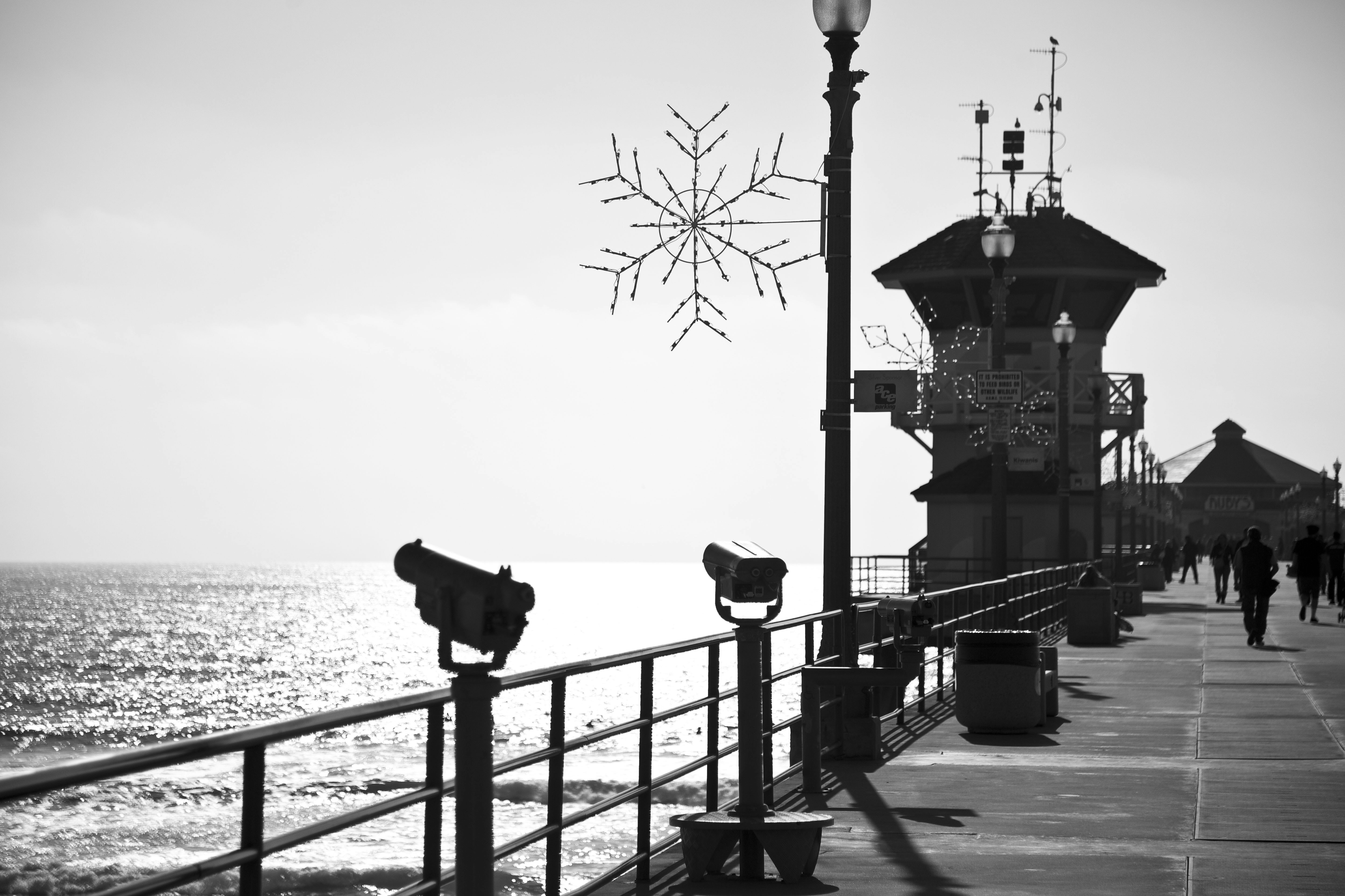Coastal Promenade at Dusk: Snowflake Lanterns and Silence
