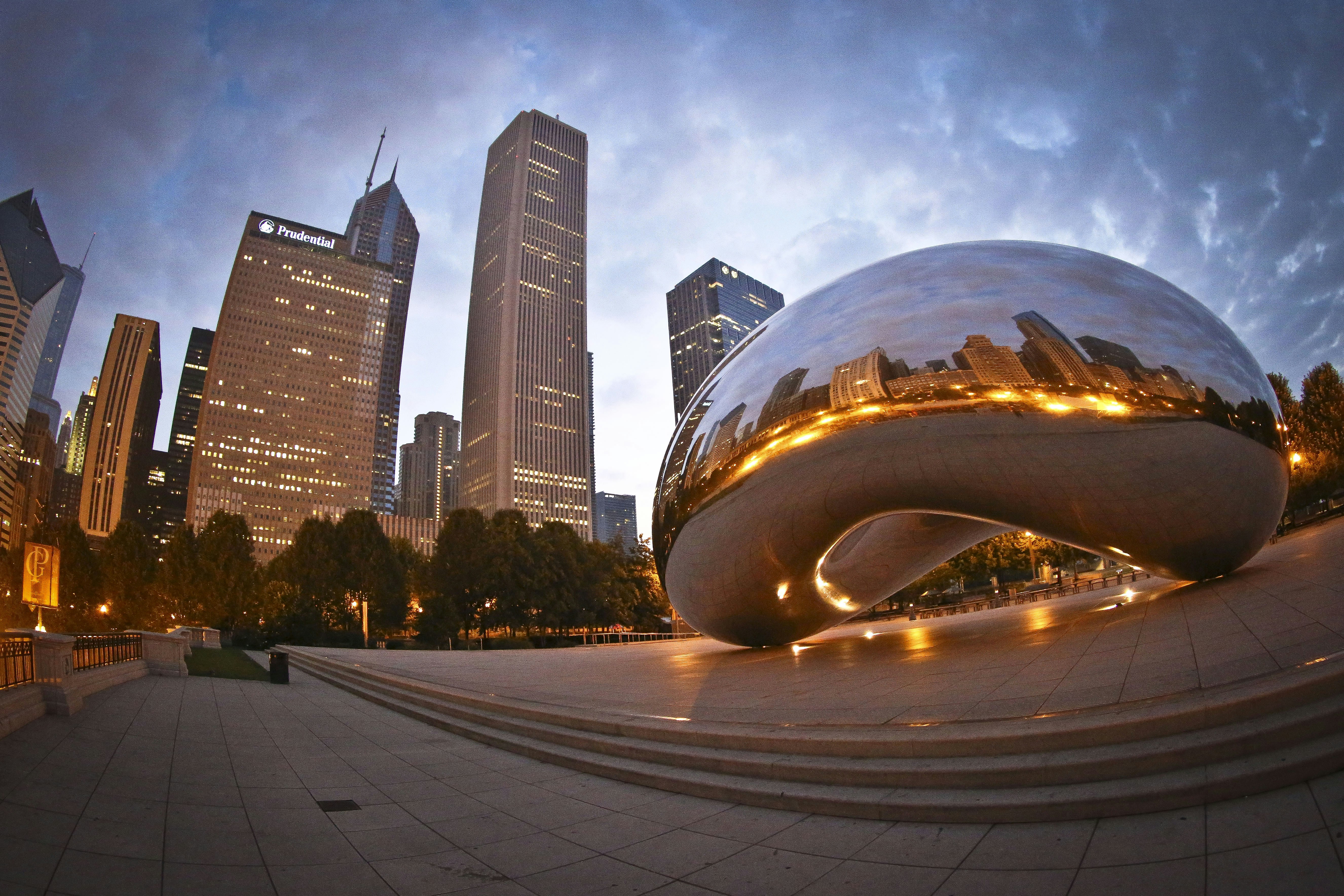 Reflections of a City in Motion: The Bean and the Skyscrapers at Dusk