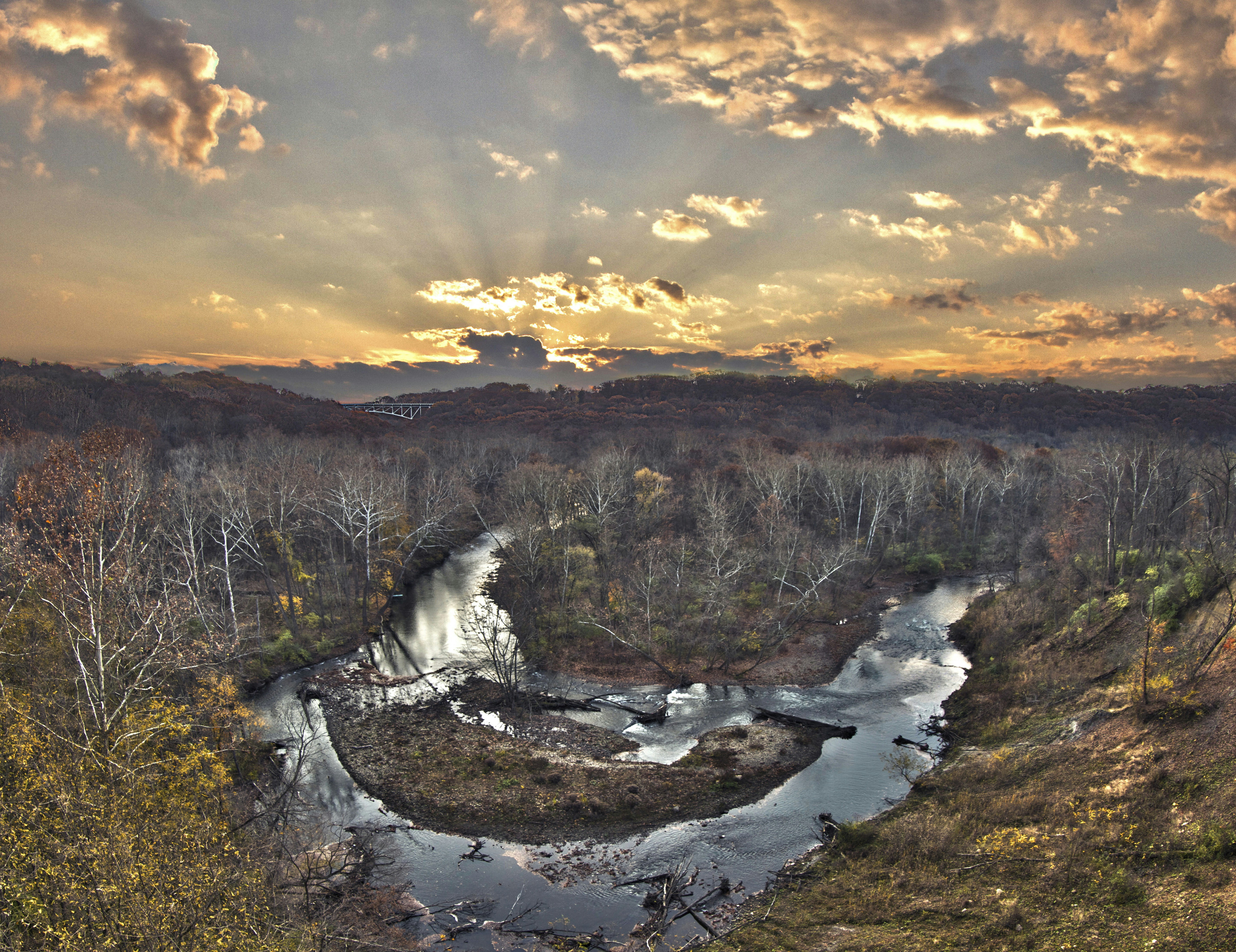 Dusk Over the Canyon: A River Carving Light and Shadow
