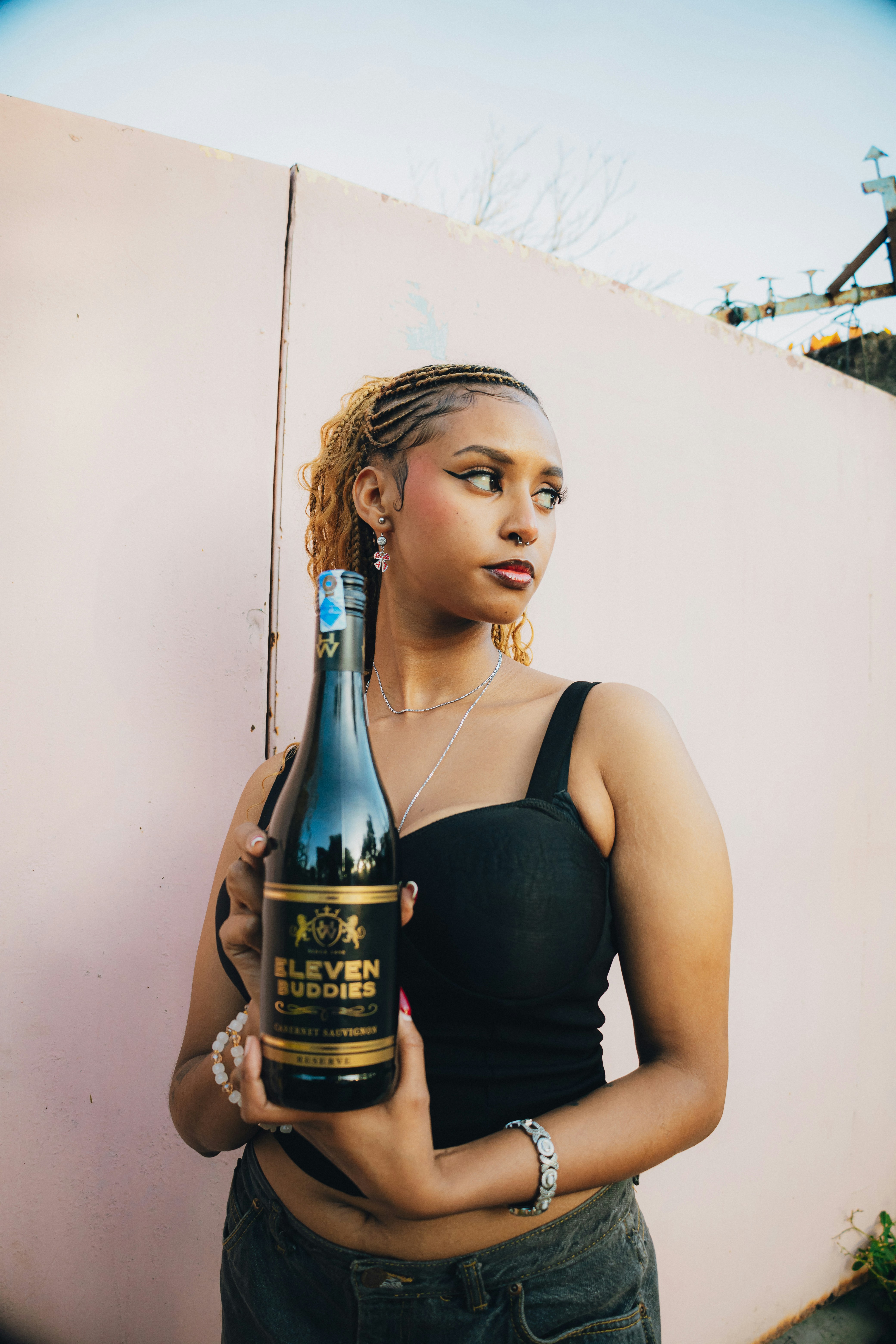 Bottle of Confidence: A Portrait with a Sparkling Pose