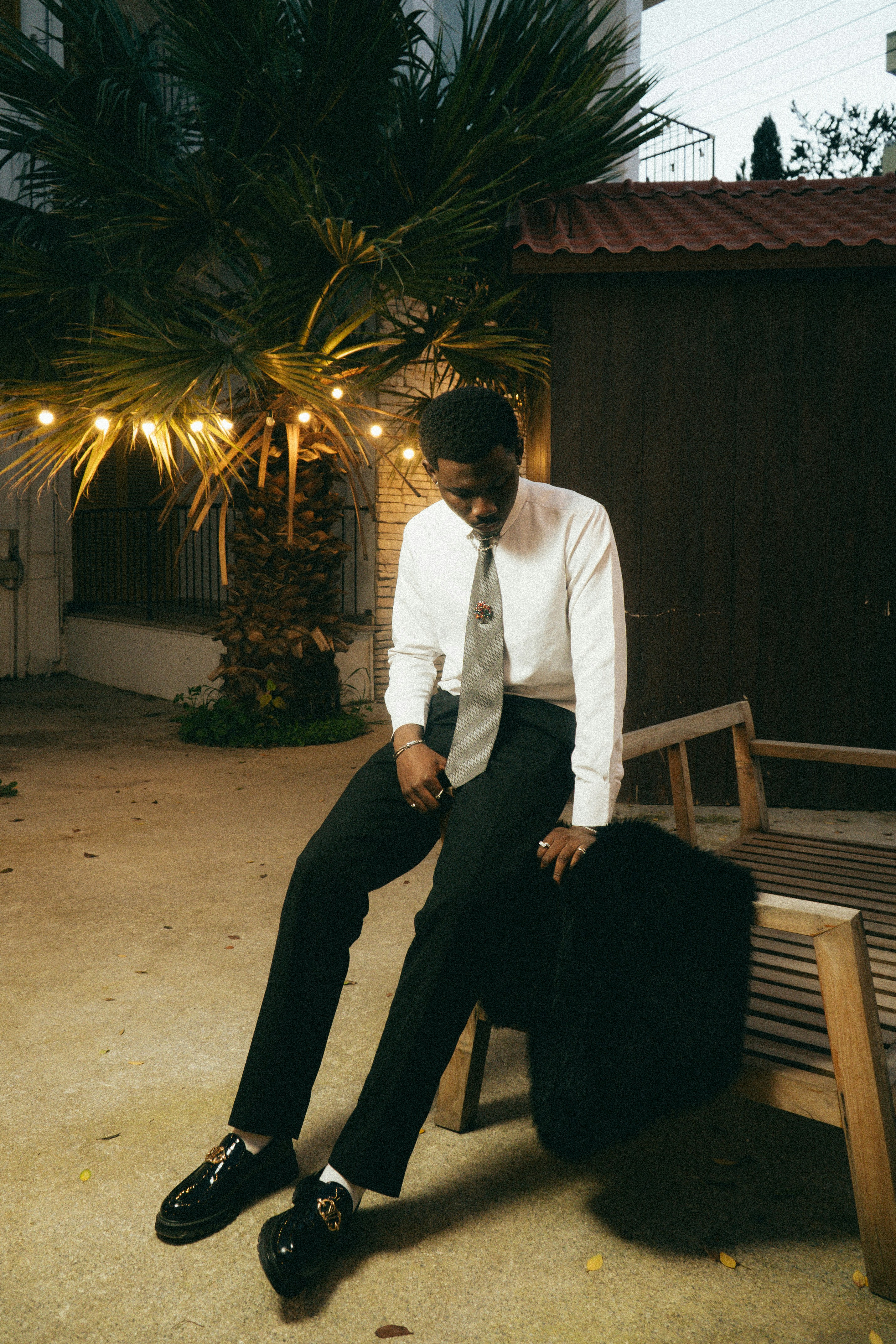 Quiet Confidence: A Portrait on a Dim Evening