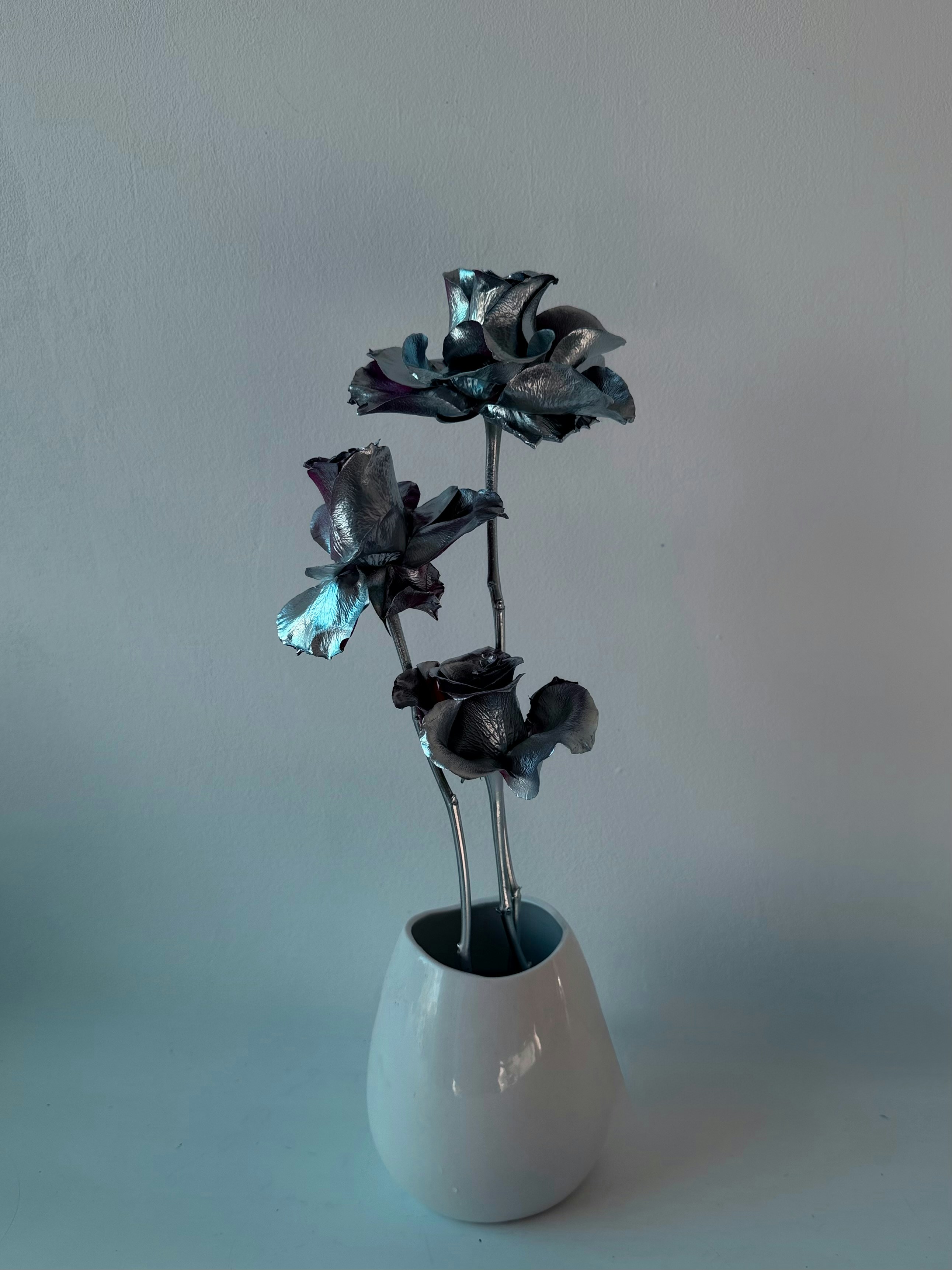 Pastel Steel Petals in a Narrow Vase