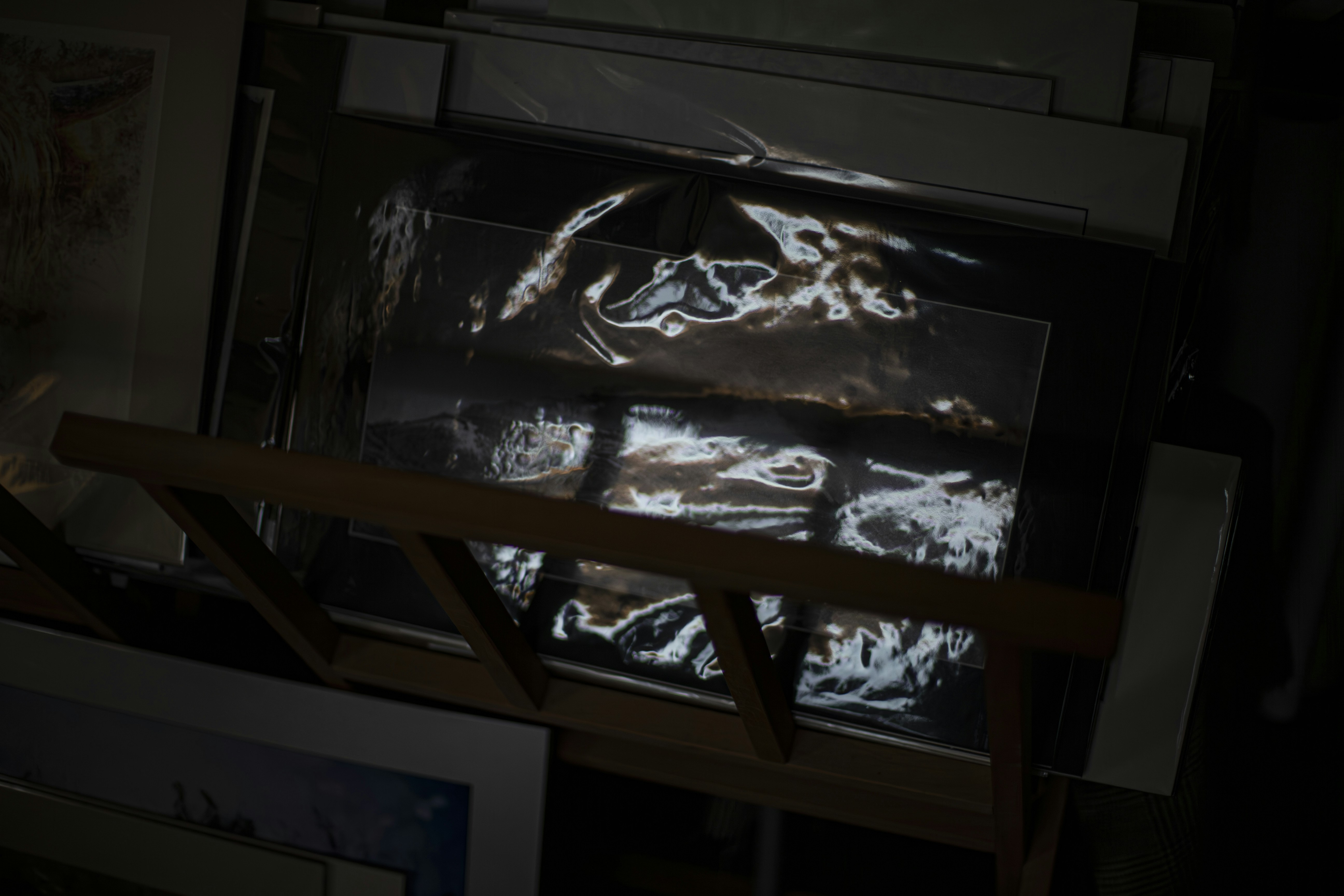 Dim Studio: A Glimpse Through the Glass of Framed Art