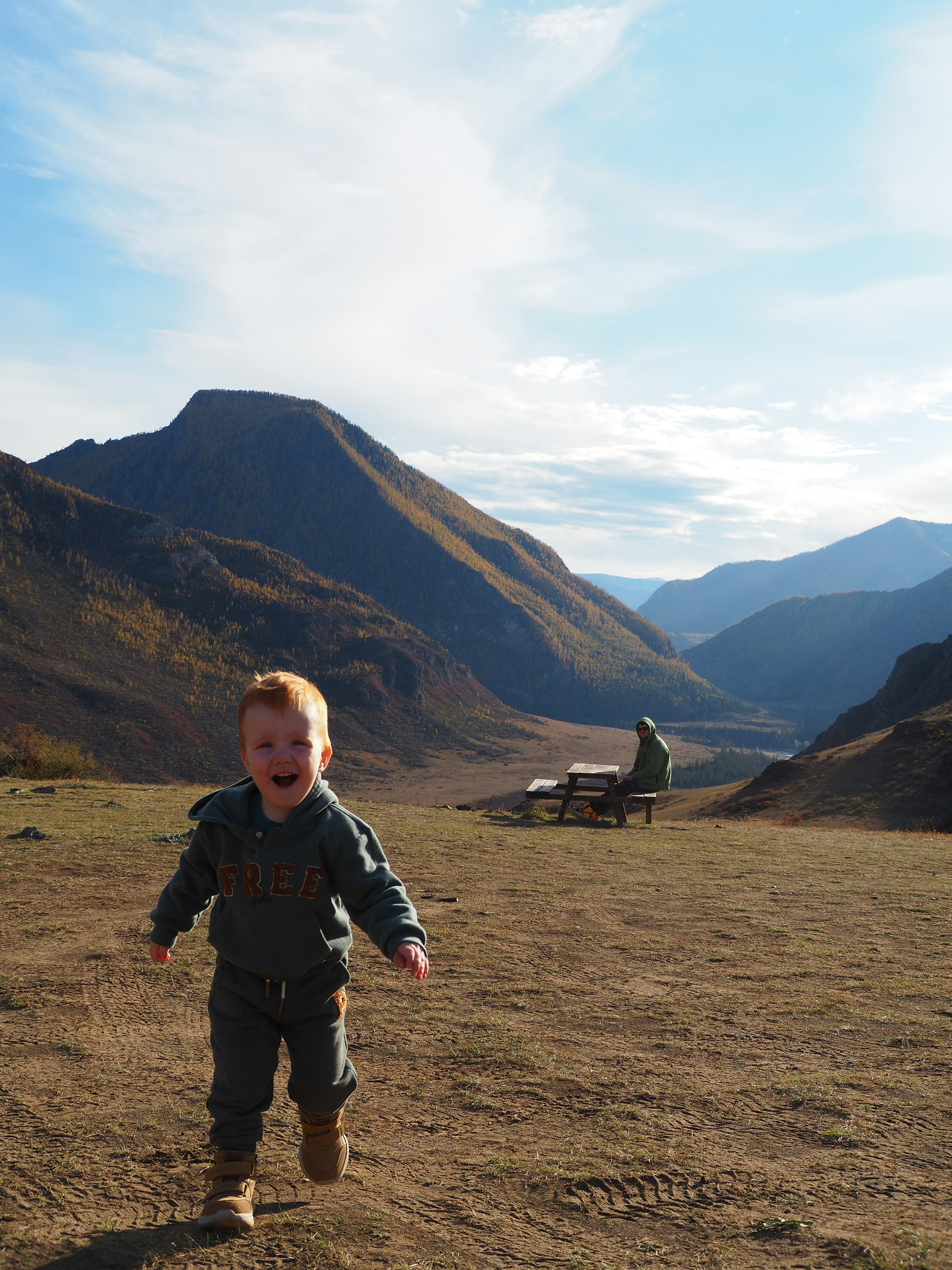 Joyful Runner in a Mountain Meadow