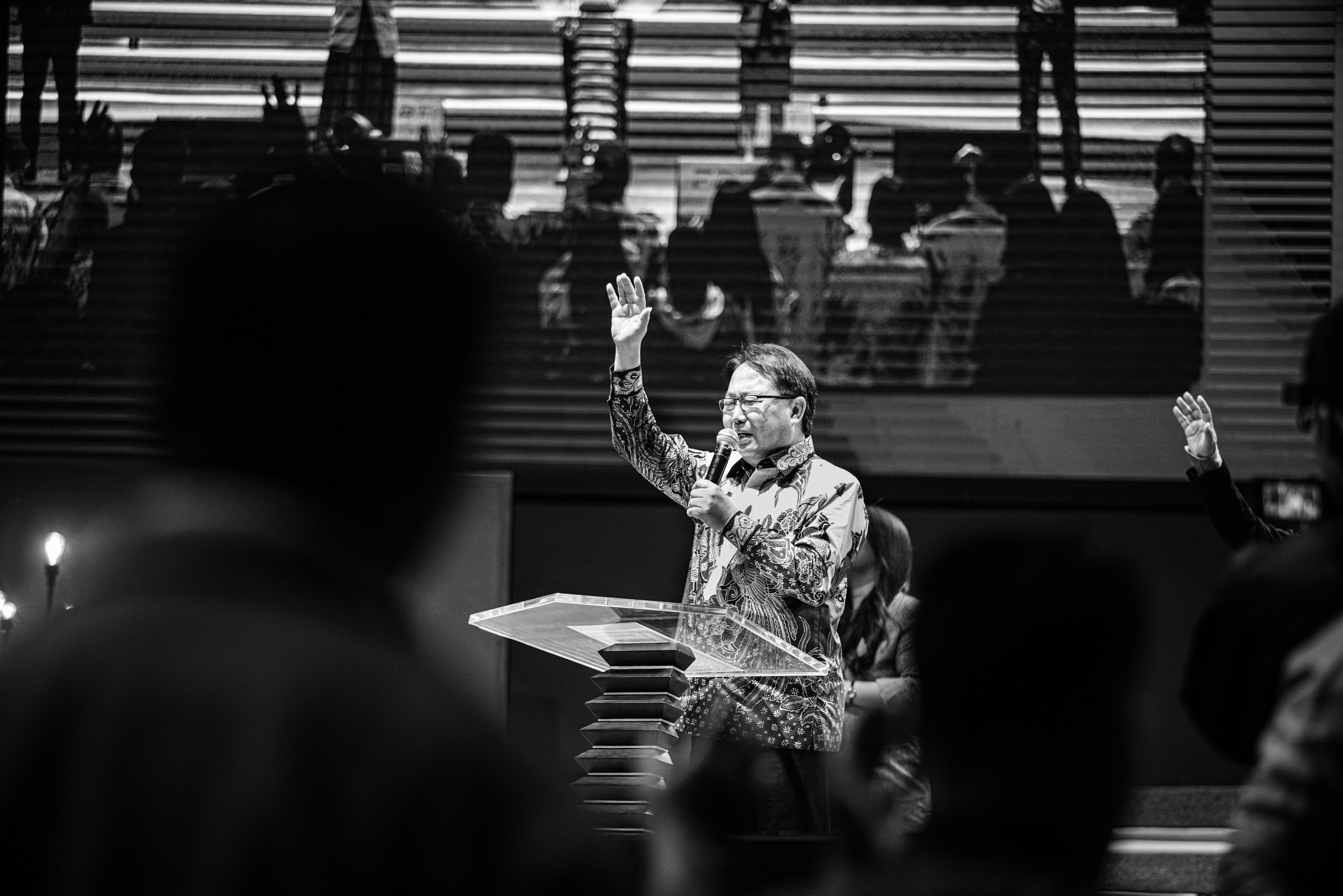 Raising Voices: A Speaker at the Podium Steams Ahead
