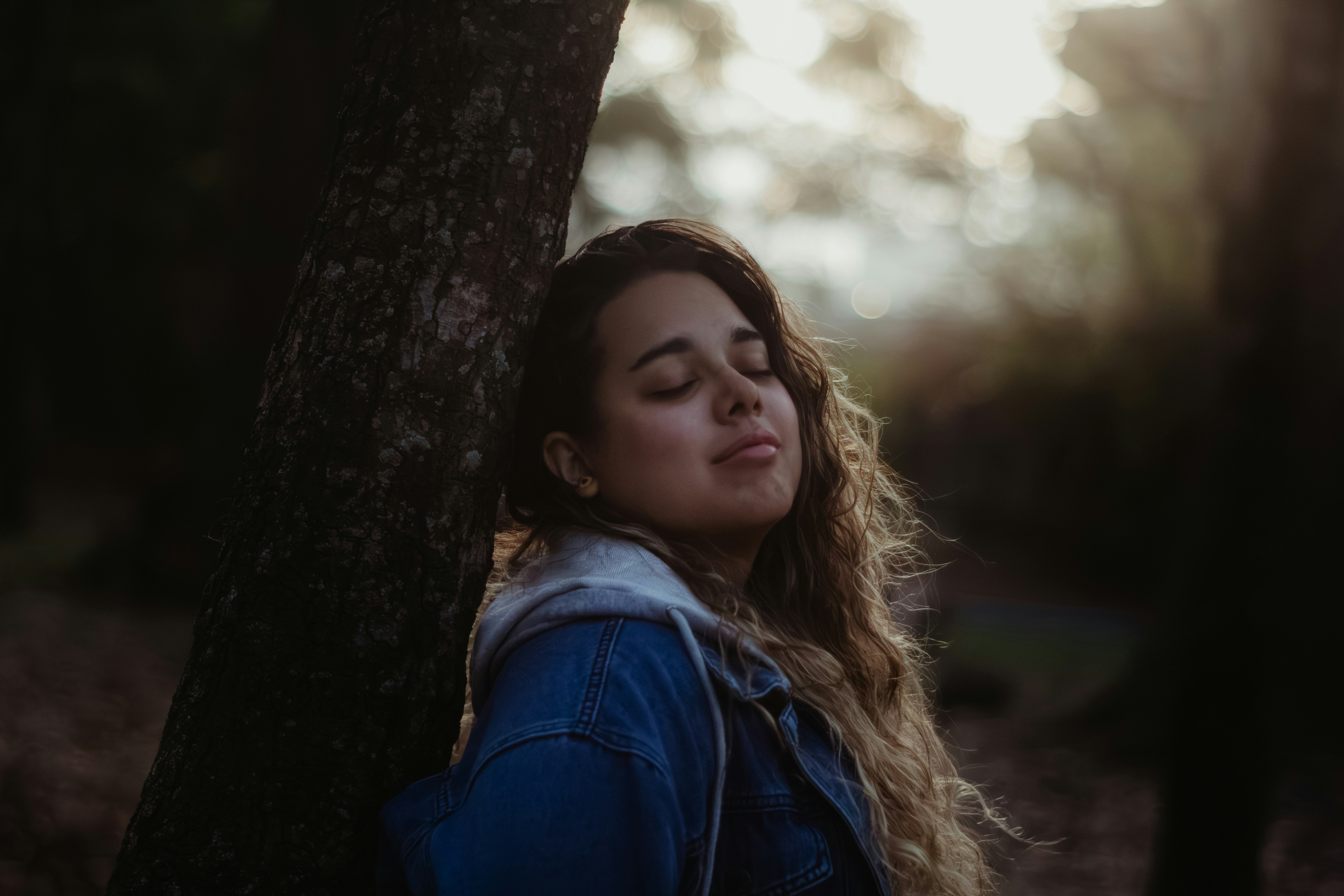 Soft hush in the woods: a quiet portrait by the sunlit edge