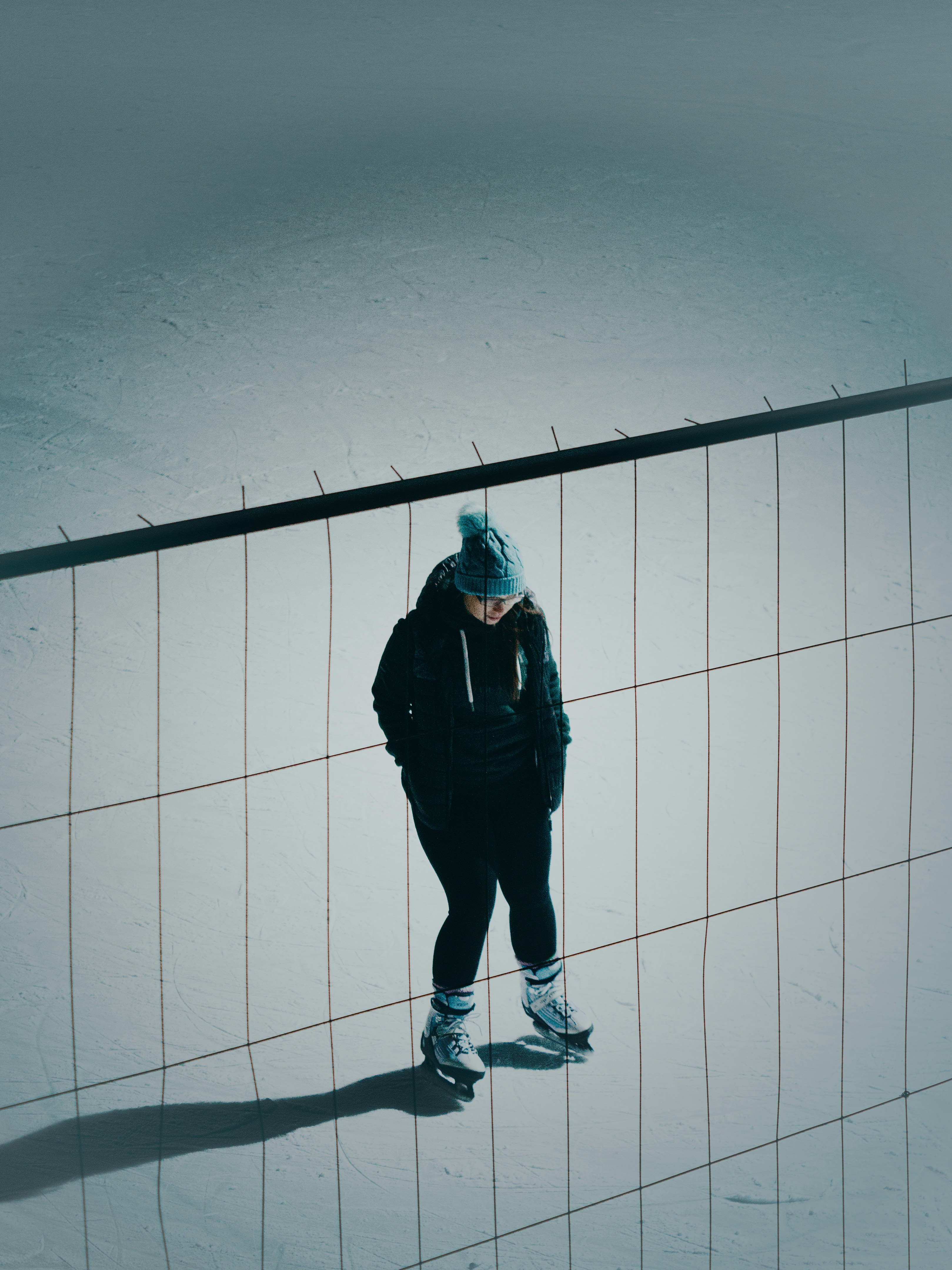  solitary figure on a snowbound balcony