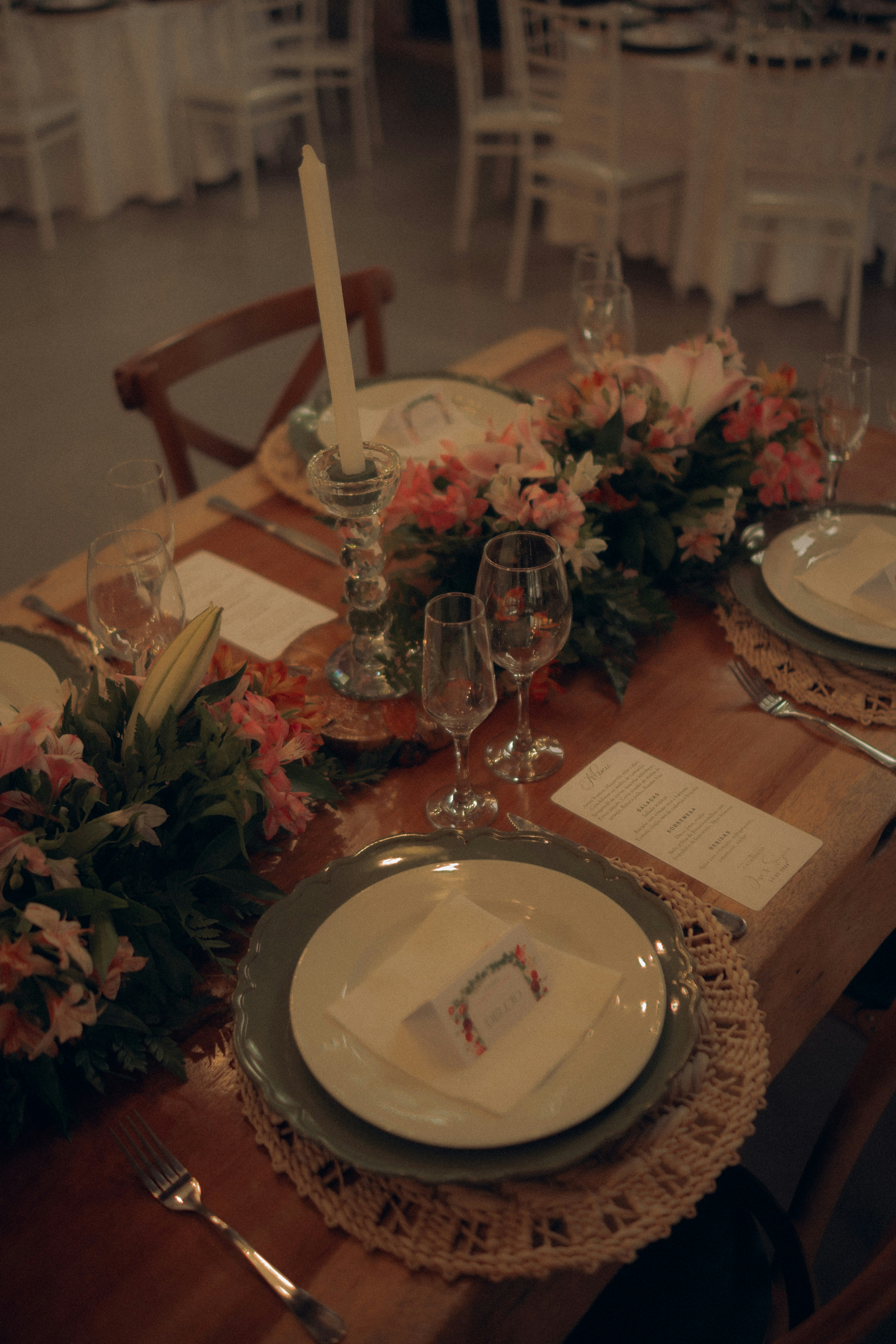Floral Centerpiece and Candles Gracing an Elegant Dinner Table