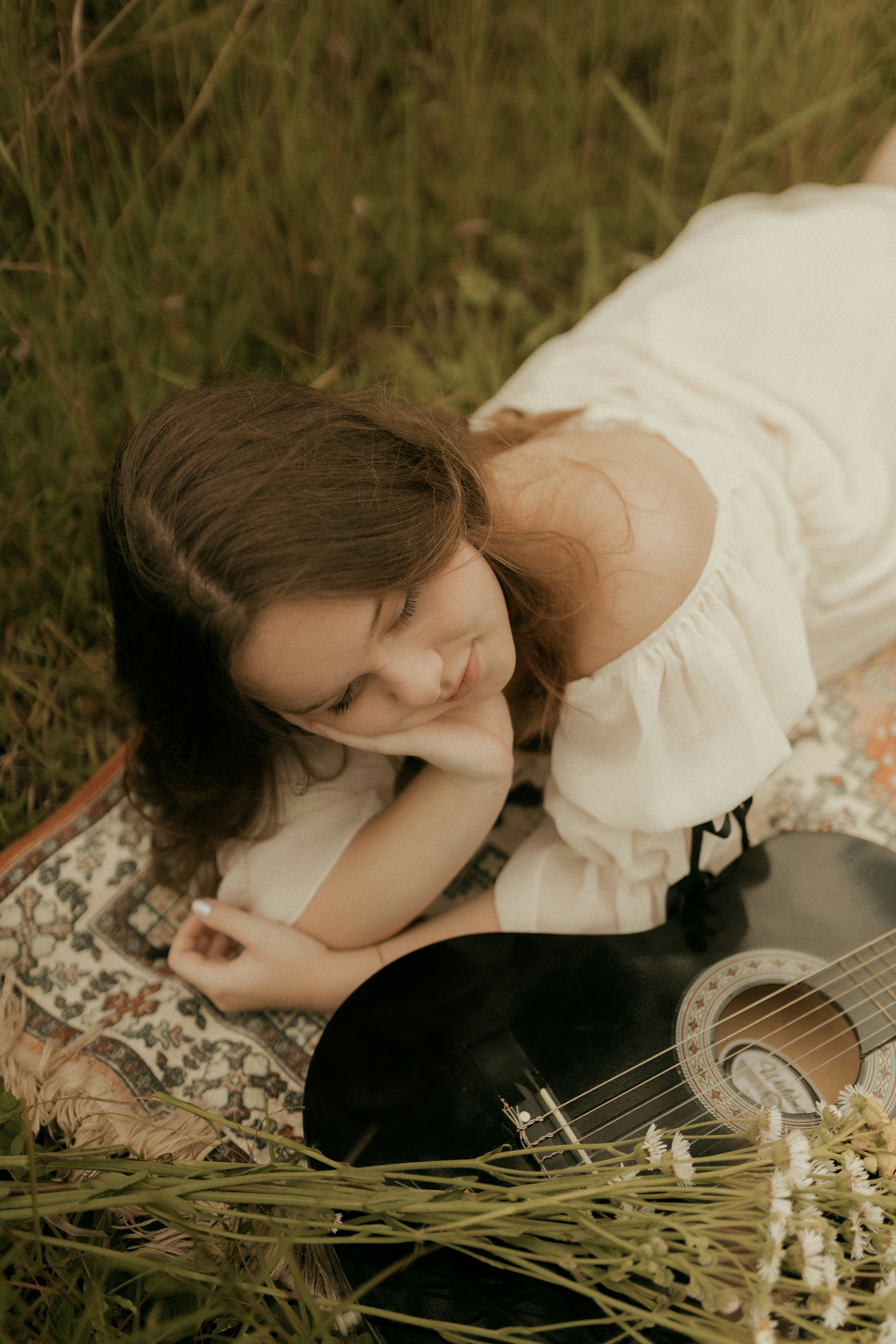 Soft Serenade in the Meadow: A Quiet Moment with a Guitar