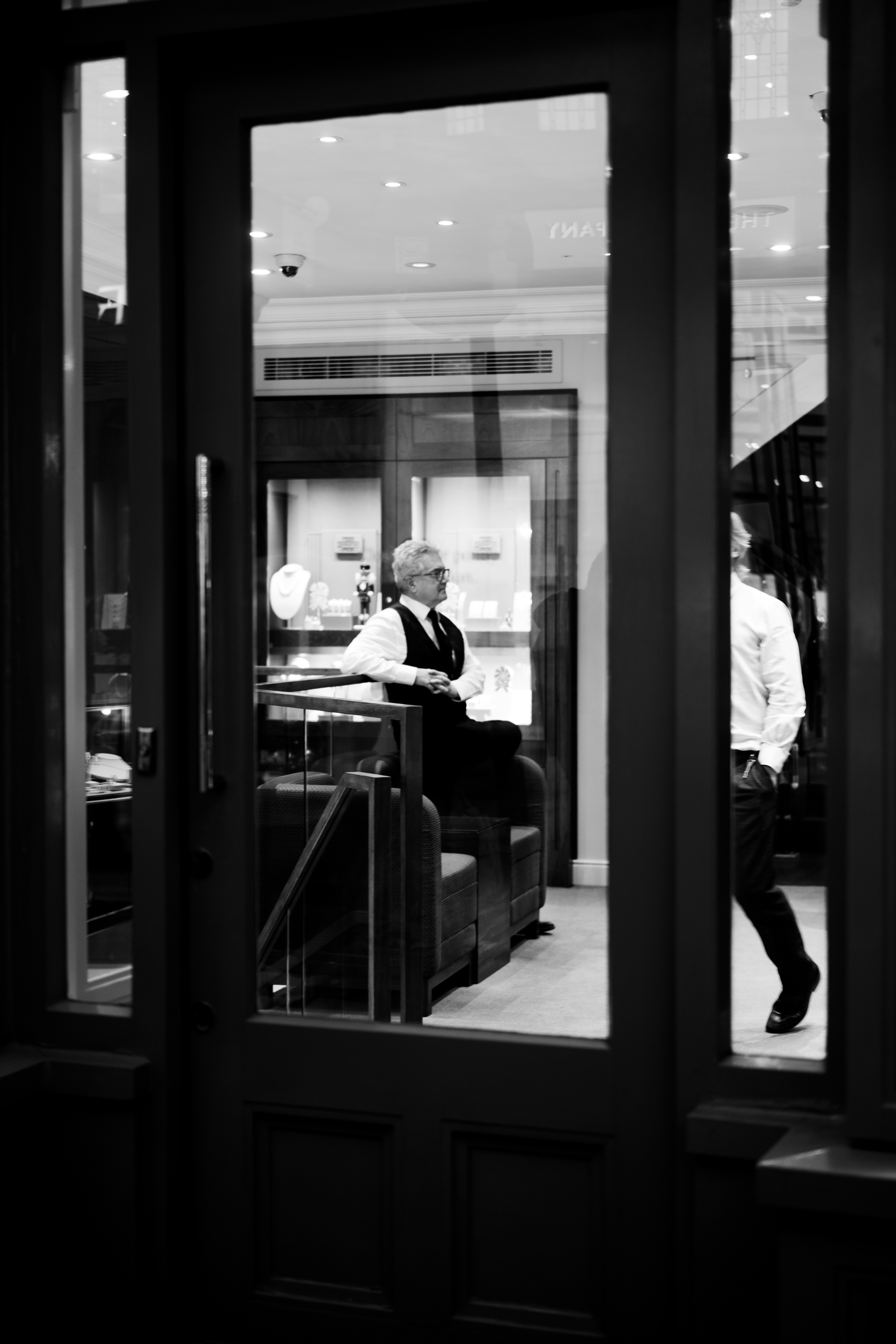 Quiet Barista in a Glass Frame