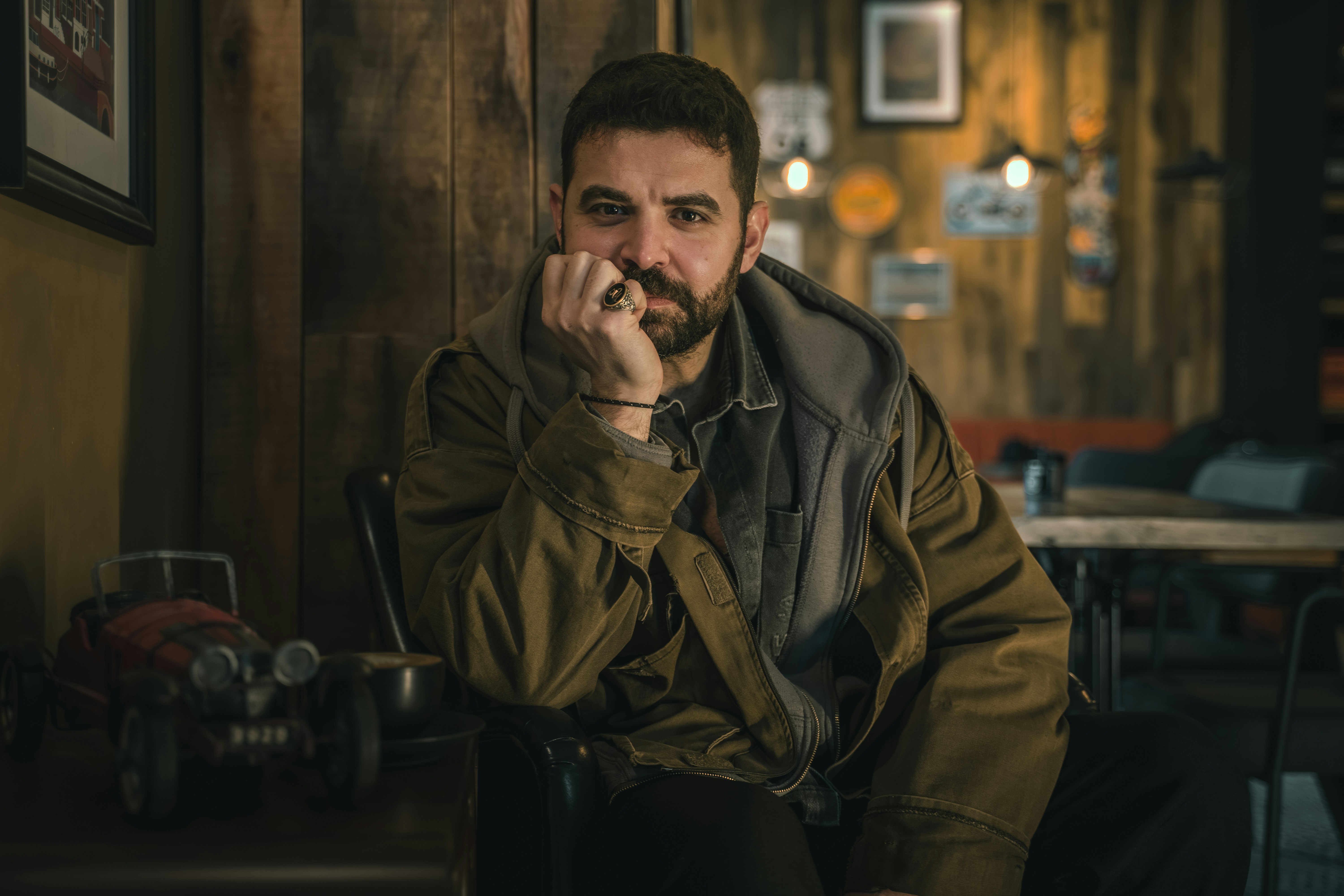 Quiet Contemplation in a Dim Café