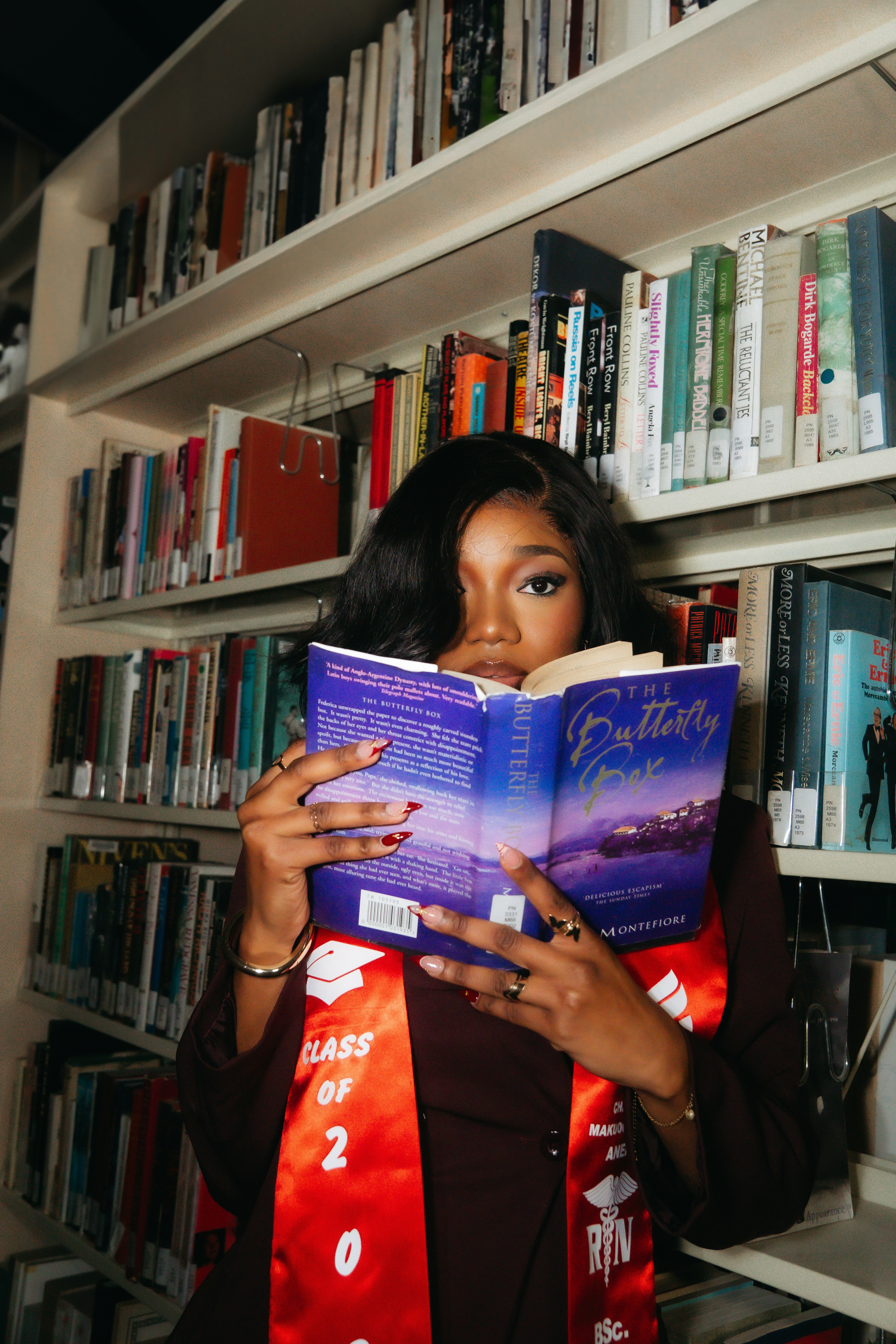 Reader in Focus: A Portrait in the Library Glow