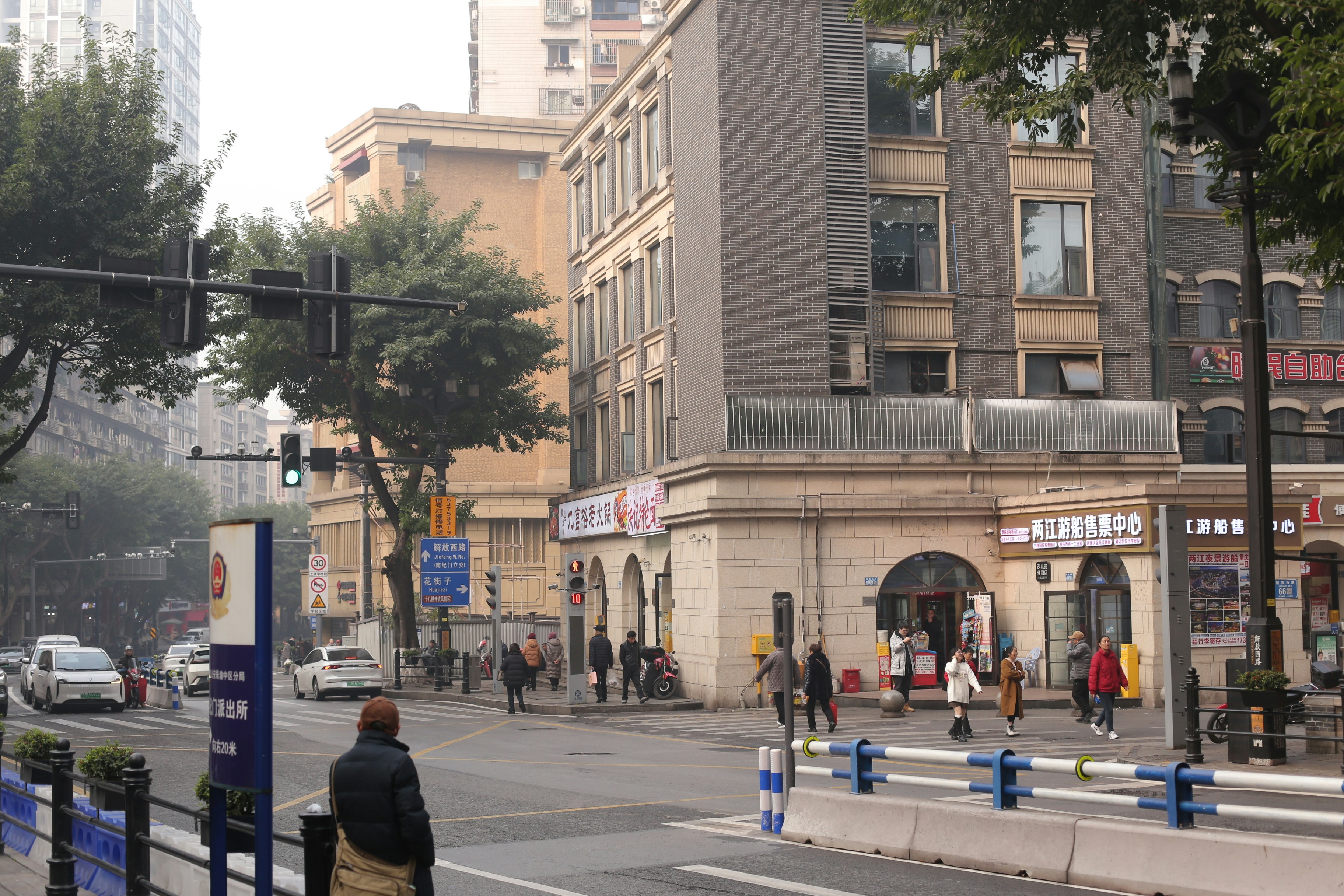 Street Corner Panorama: Pedestrians and Classic Building Facade