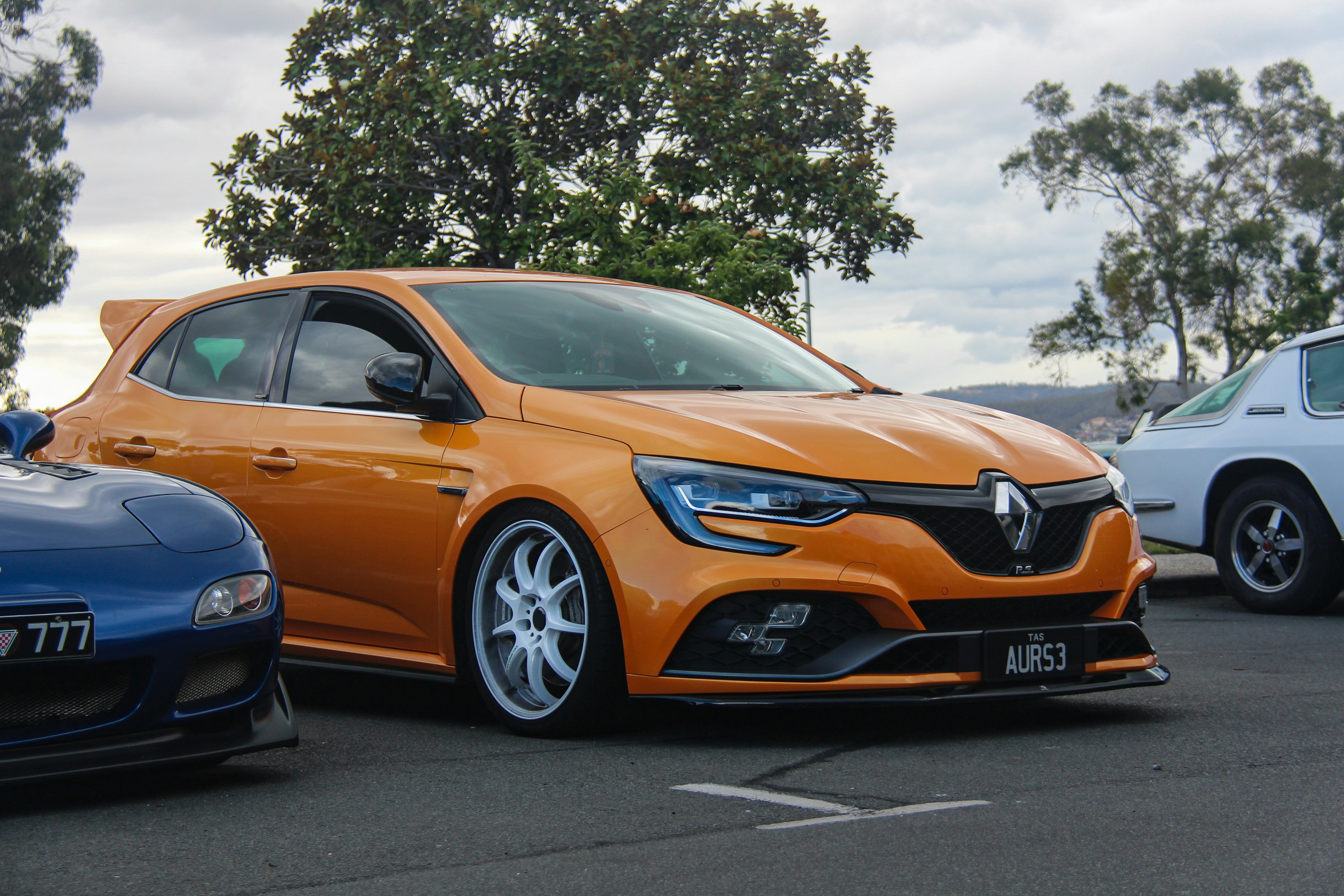 Orange Renault Stance: A Low Car Show Glimpse