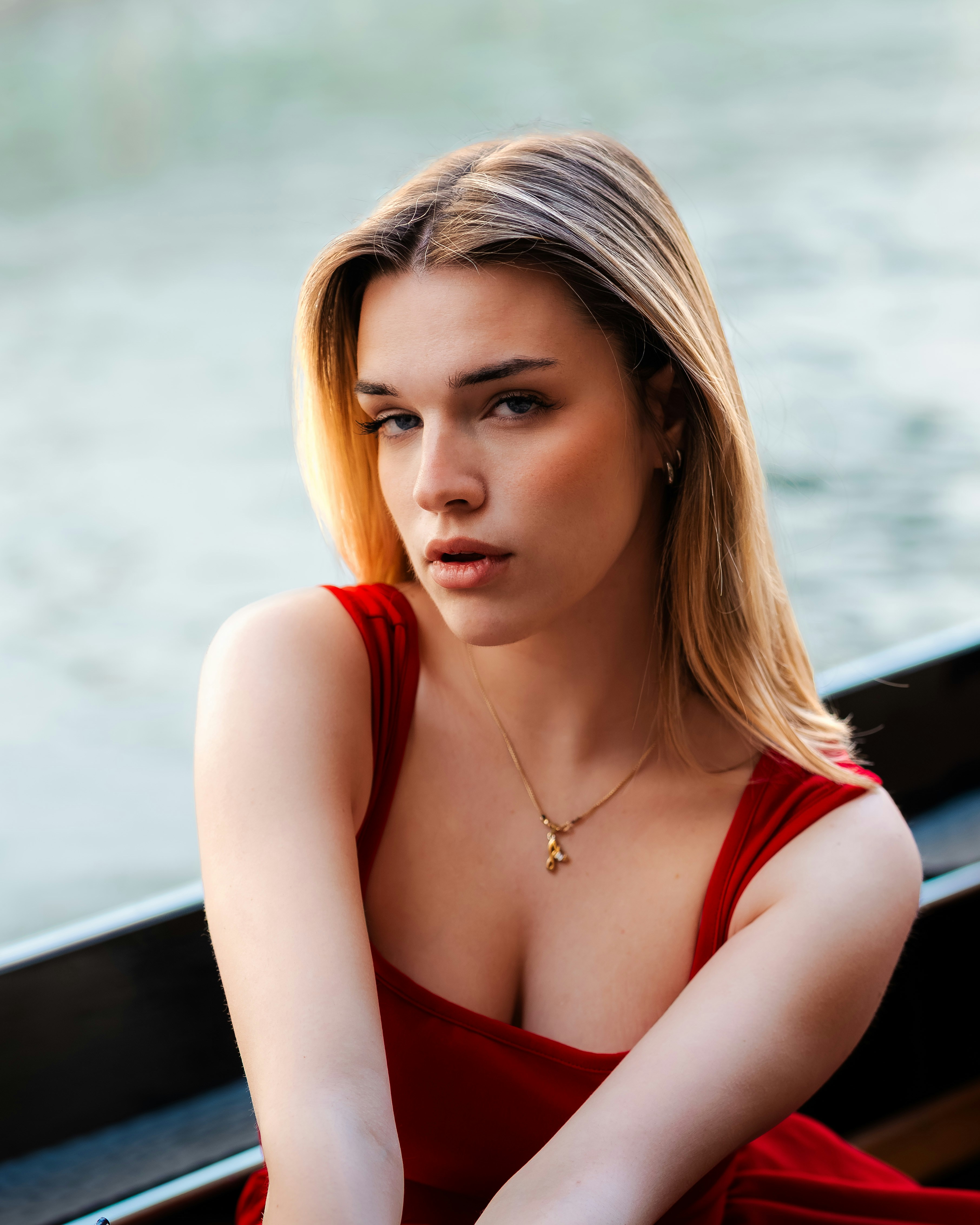 Soft Verve by the Water: Portrait in Red