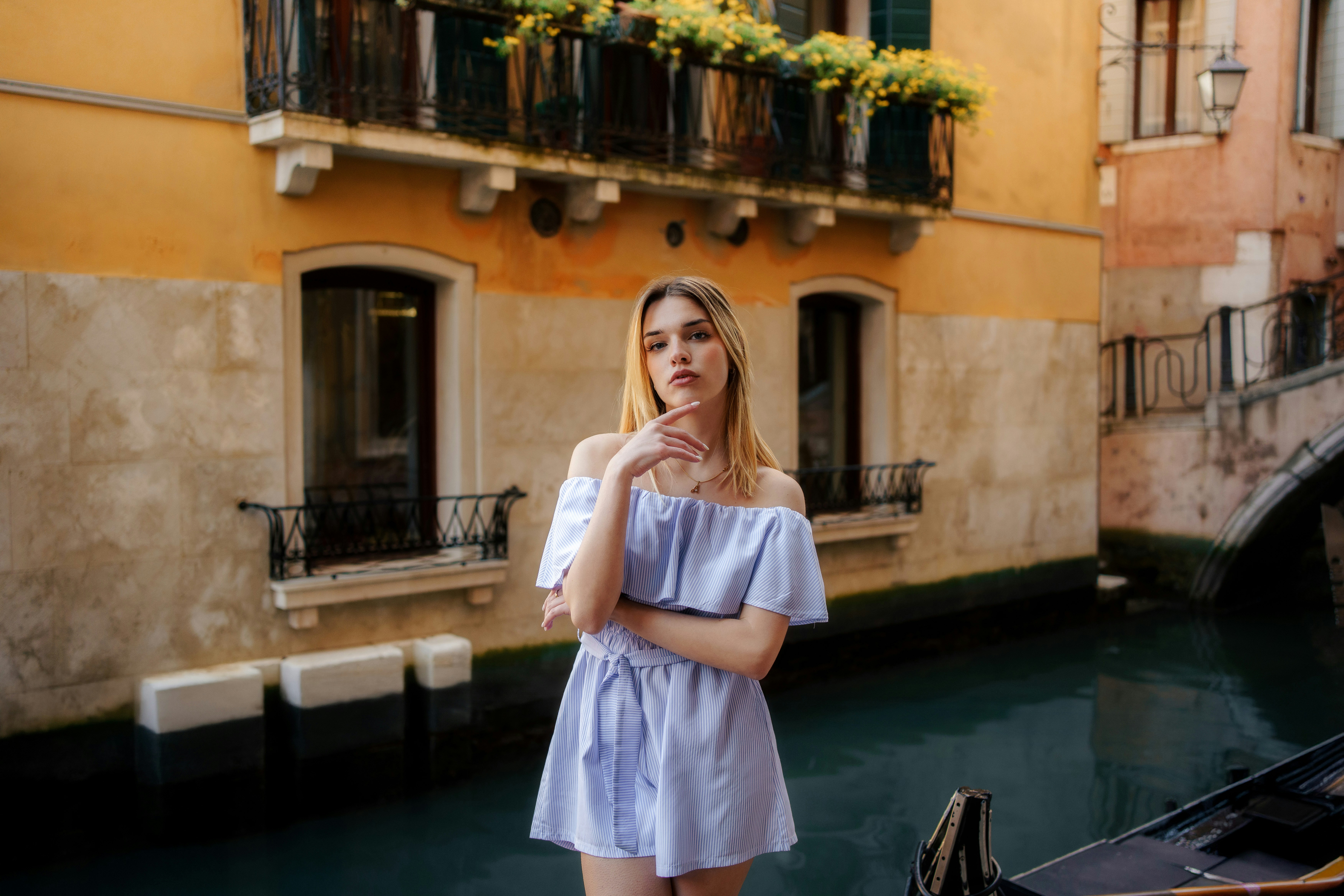 Sunlit Rialto Portrait: Off-Shoulder in a Canal Courtyard
