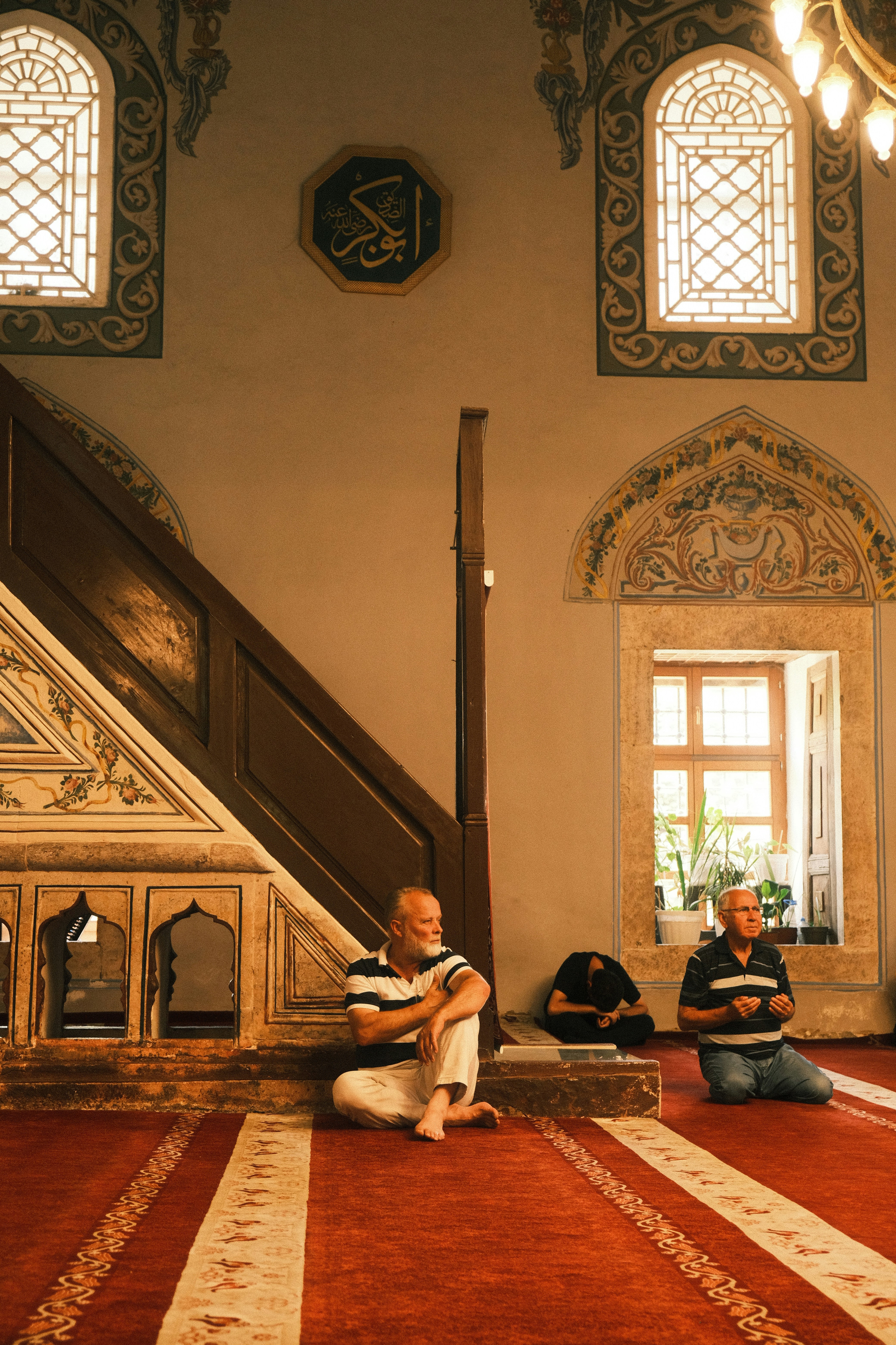 Silence in the Mosque: A Quiet Pause by the Stair
