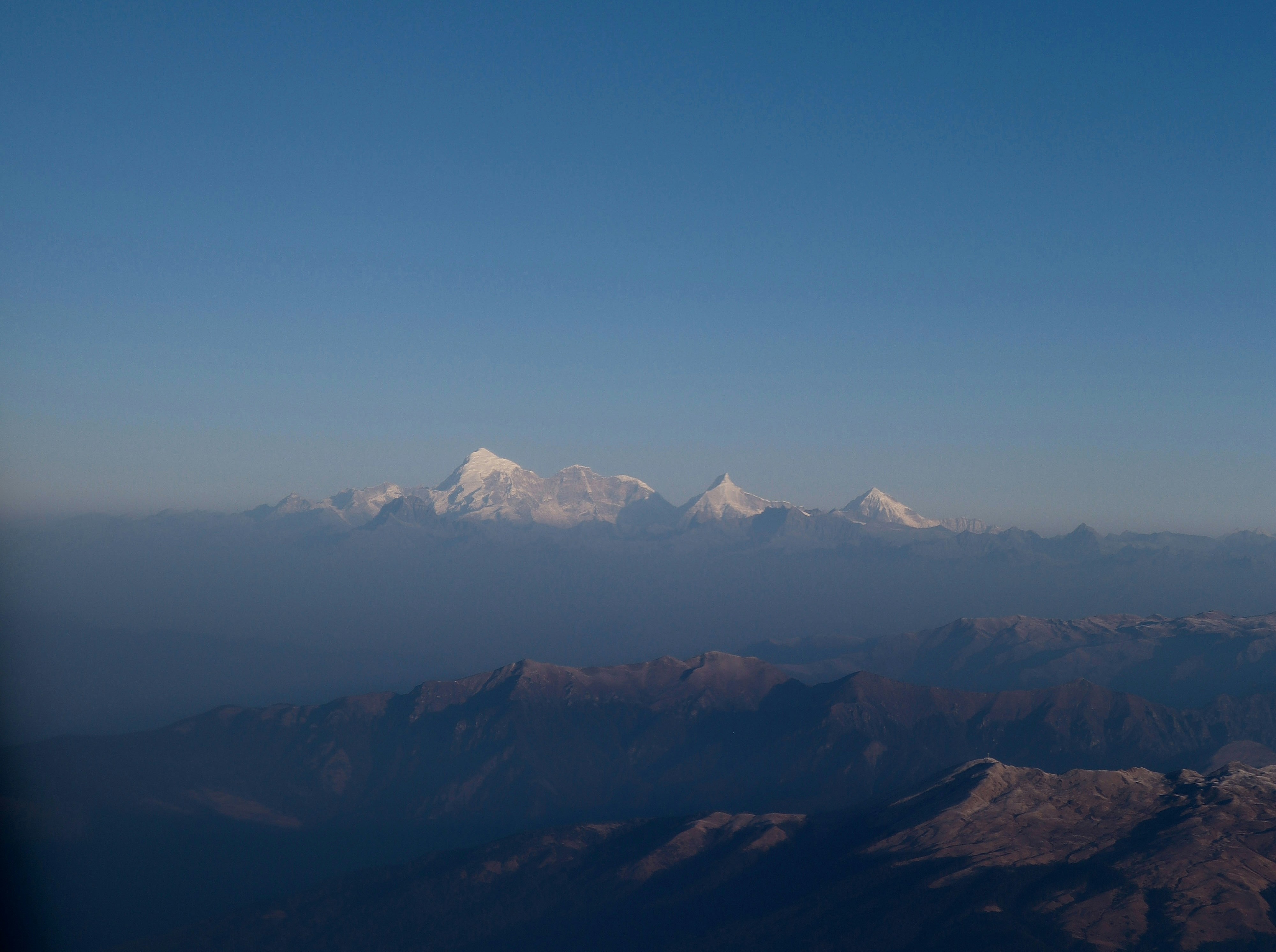 Snow-capped Peak Horizon over a Quiet Range