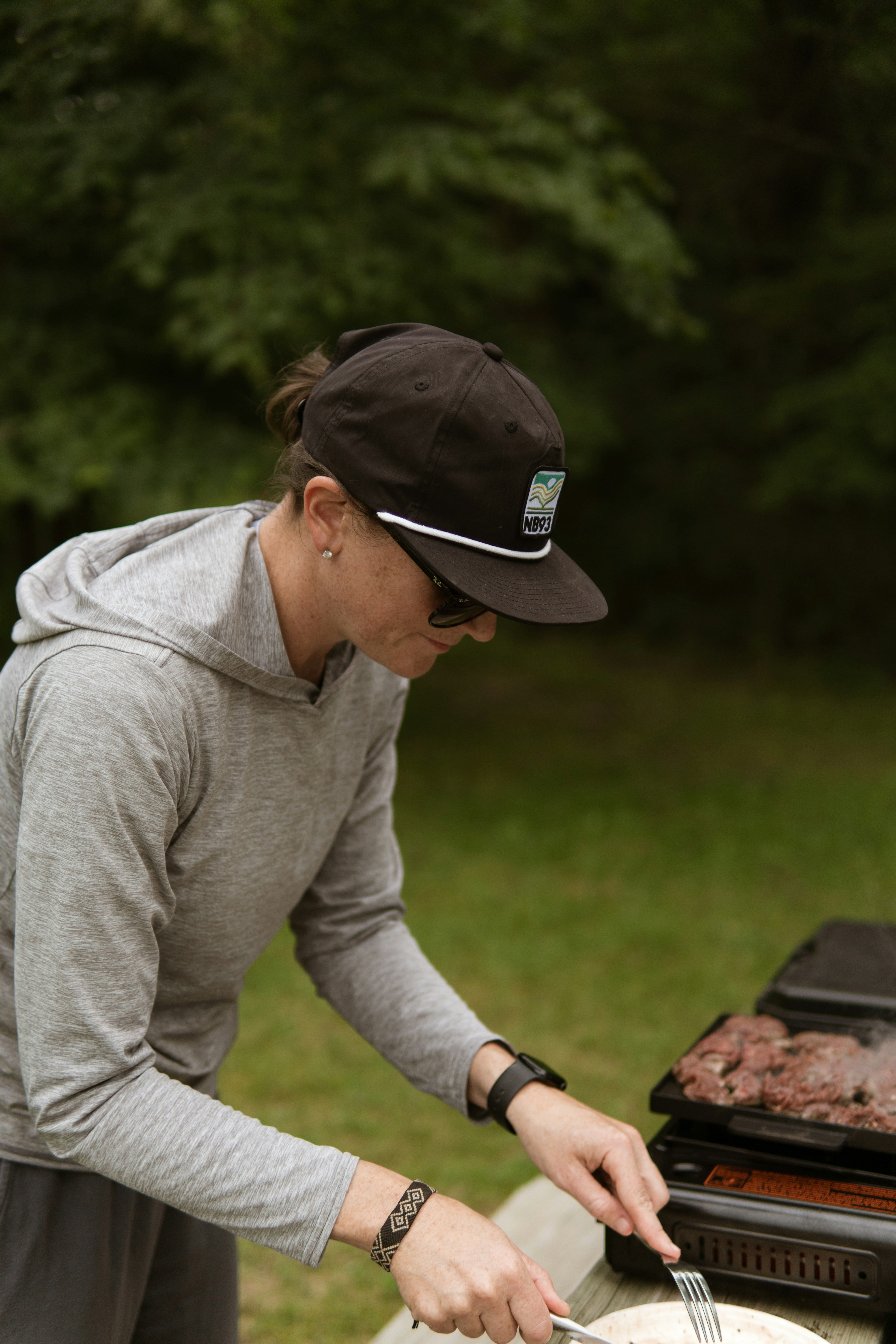 Grill-side Focus: Preparing the Meal in a Calm Outdoor Moment