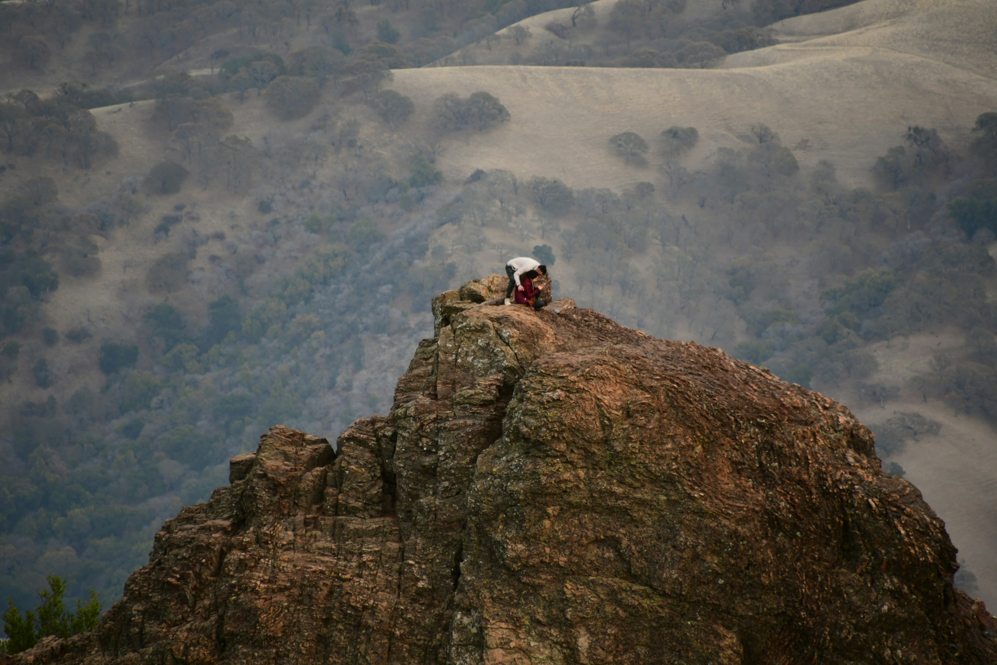 Ridge Scout: A Climber perches at the summit’s edge