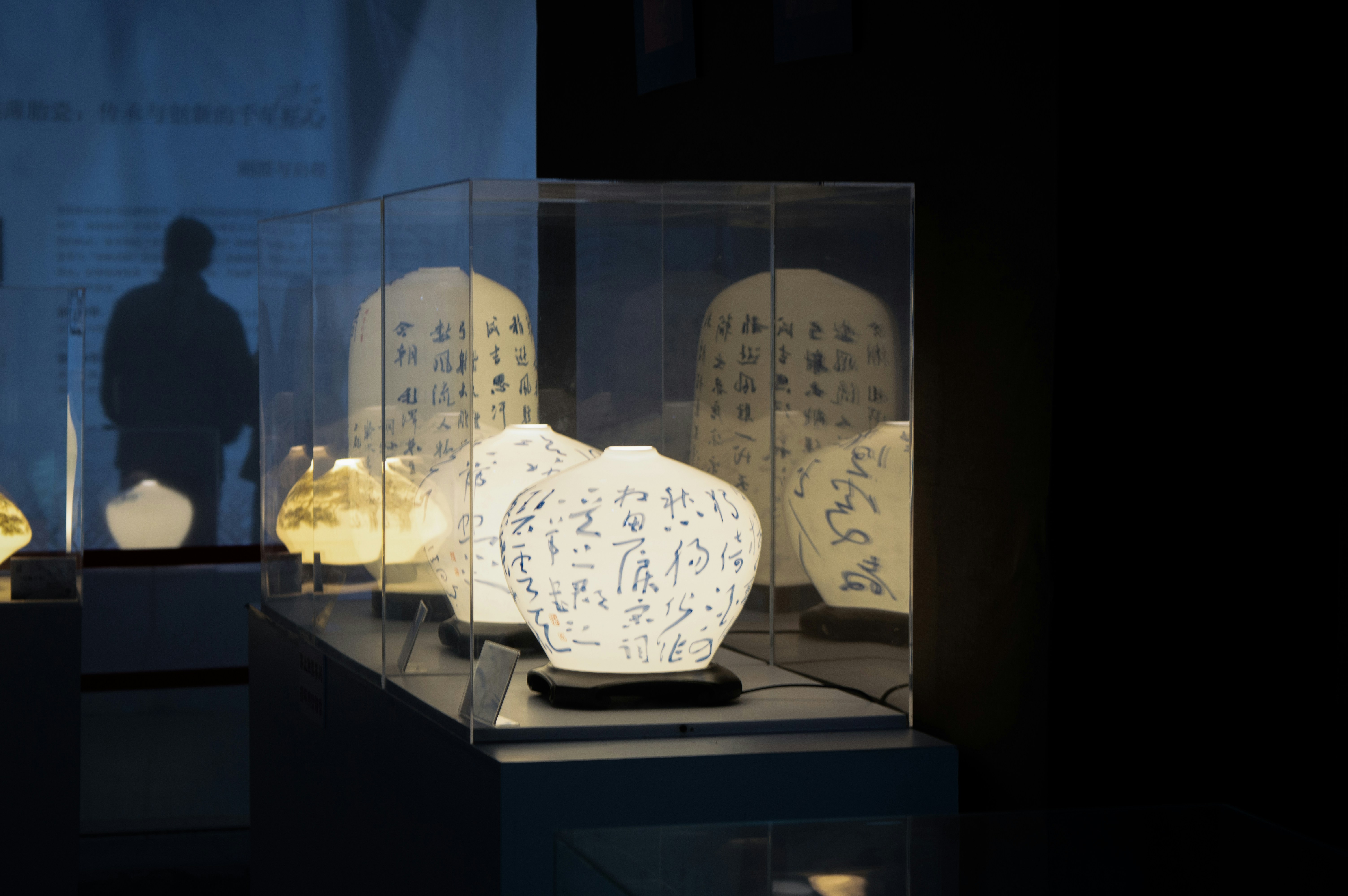 Glass Case Radiance: Illuminated Orb Lanterns in a Quiet Museum