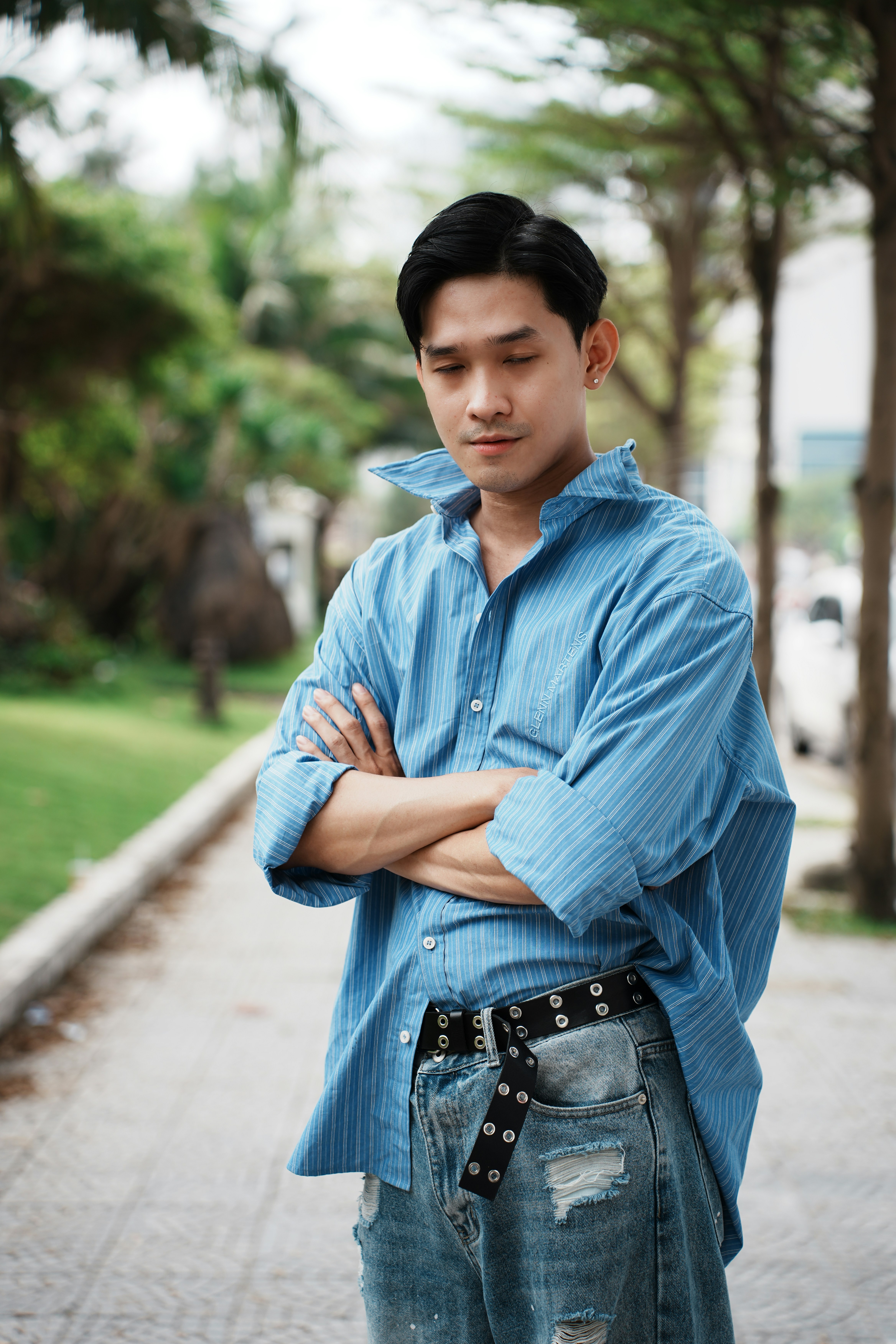 Quiet Confidence in a Blue Shirt: Street Portrait