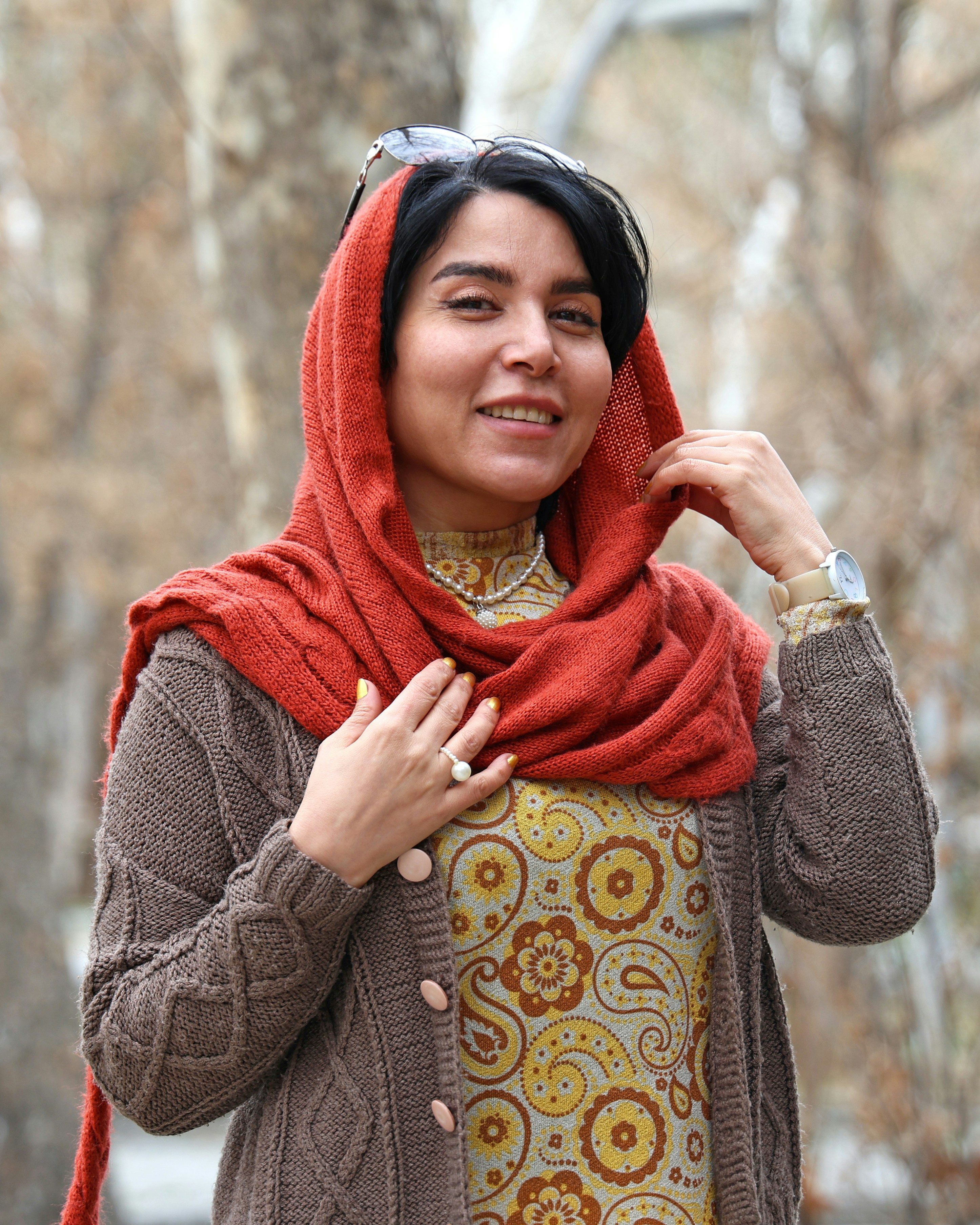 Warm Red Draped Portrait in a Forested Backdrop