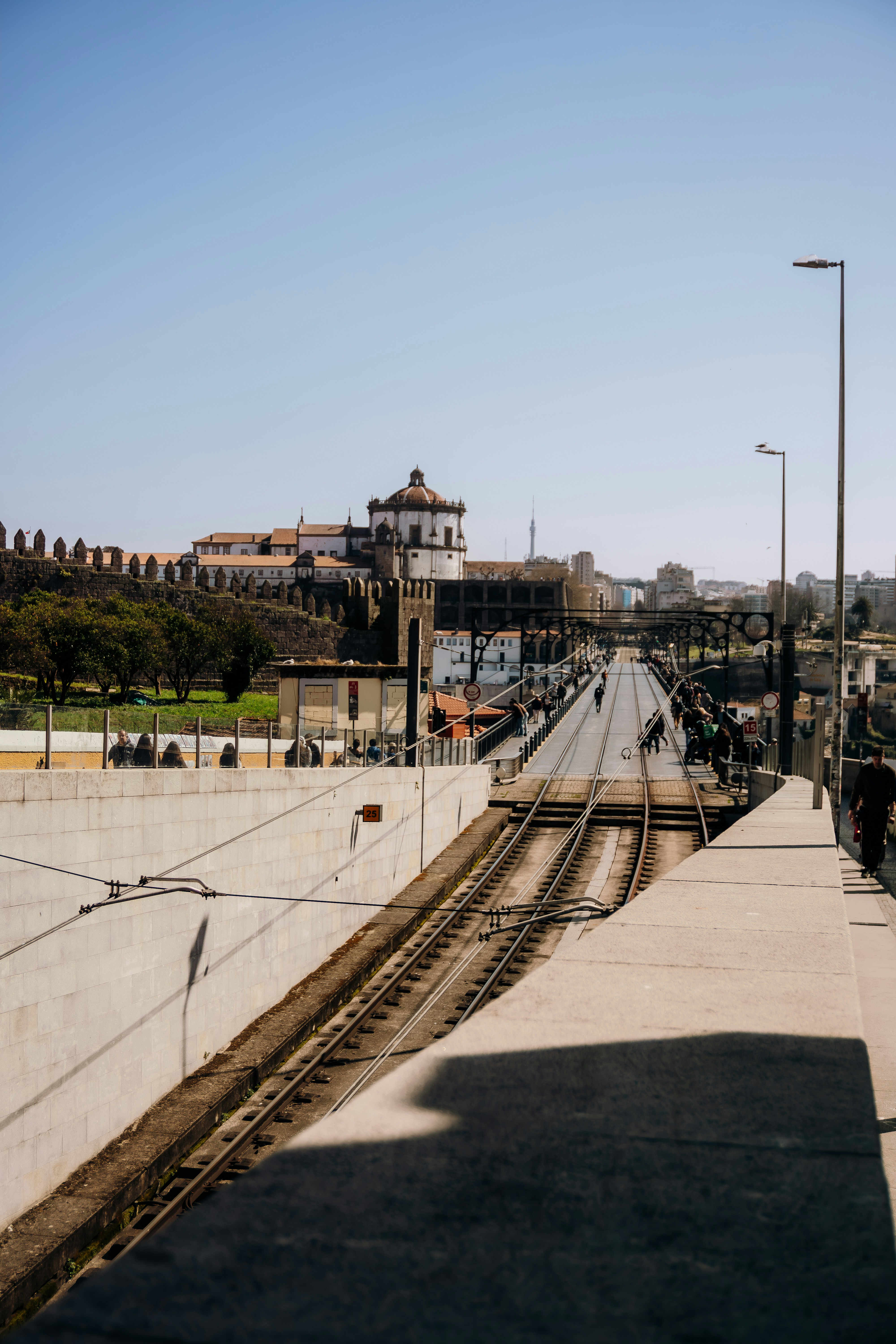 Midday Carriage: Rails Stretch into a Historic Horizon