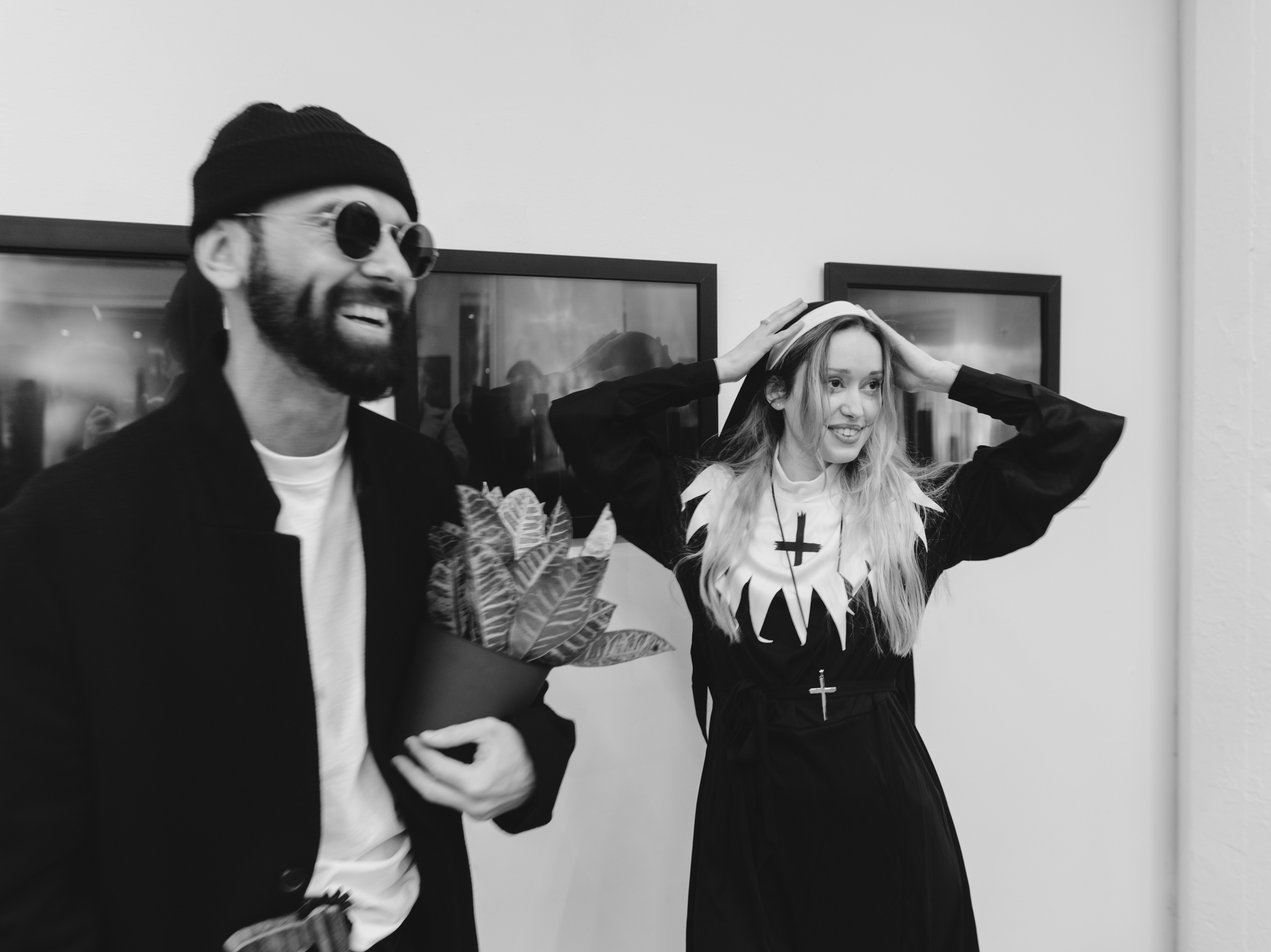 Joyful Duo at an Art Gallery Opening