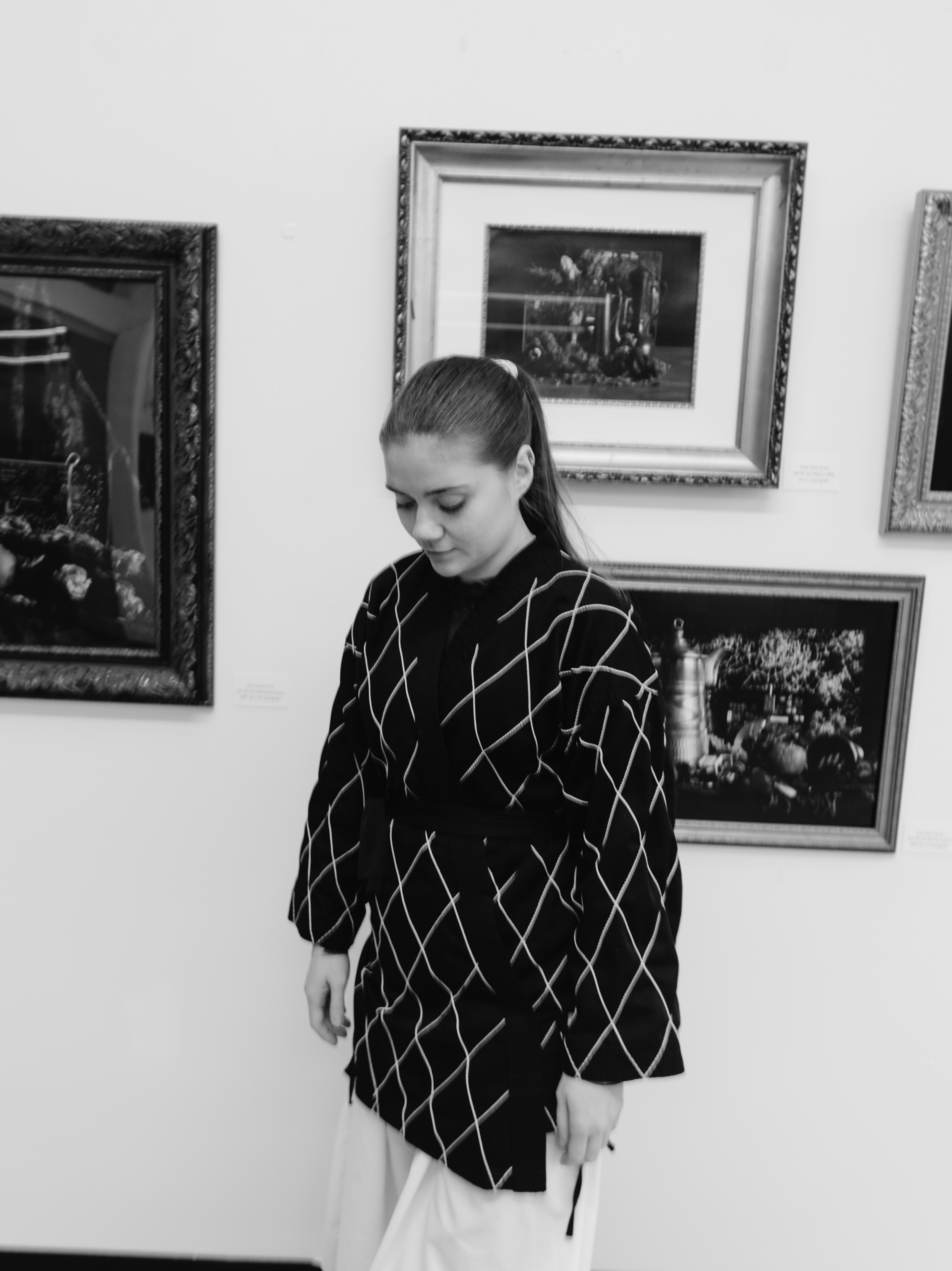 Quiet Focus: Portrait of a Young Woman in an Art Gallery