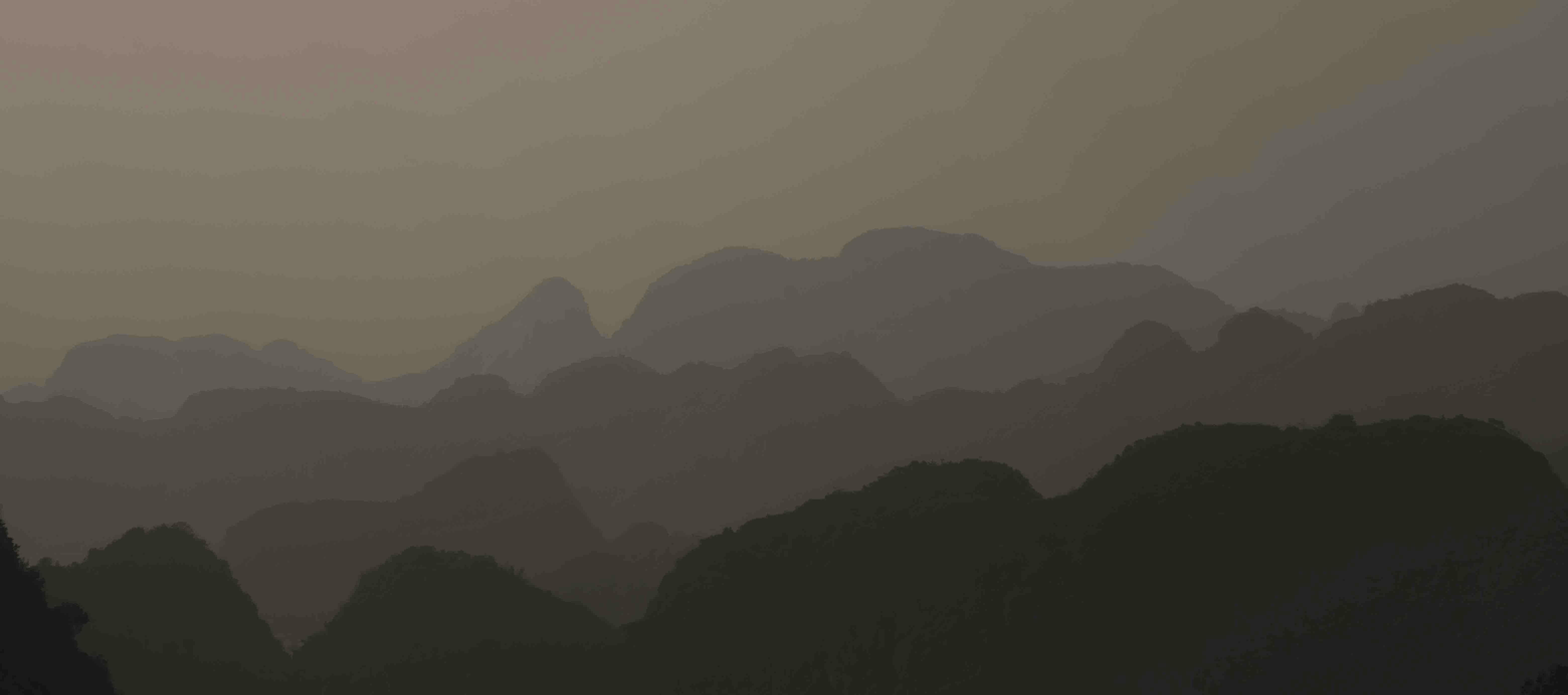 Layers of Quiet Dusk: A Misty Mountain Horizon