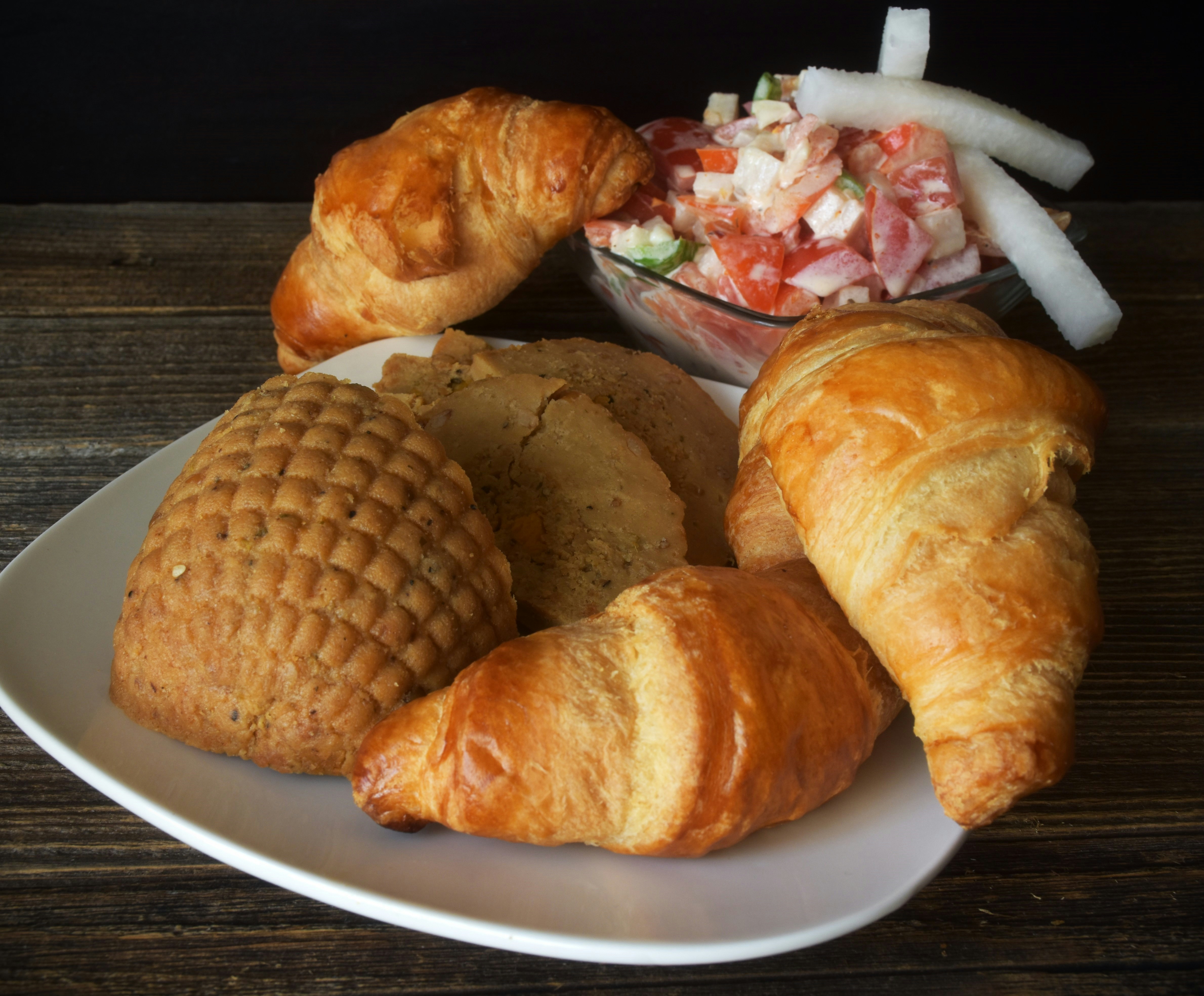 Golden Breakfast Ensemble: Croissants, Bread, and Pico de Pan Concht
