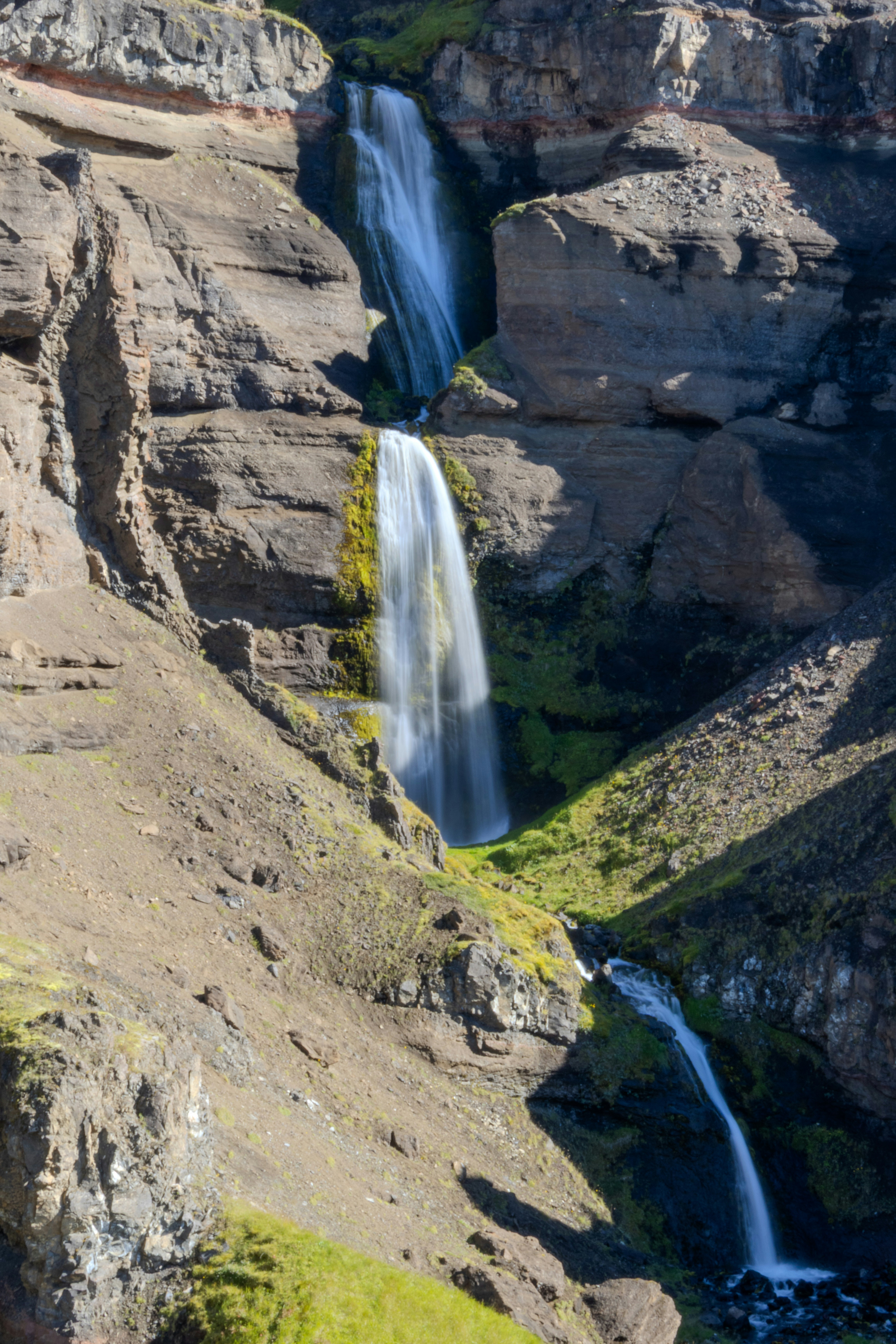 Multi-tiered Cascade Through Rugged Fiery Gorge