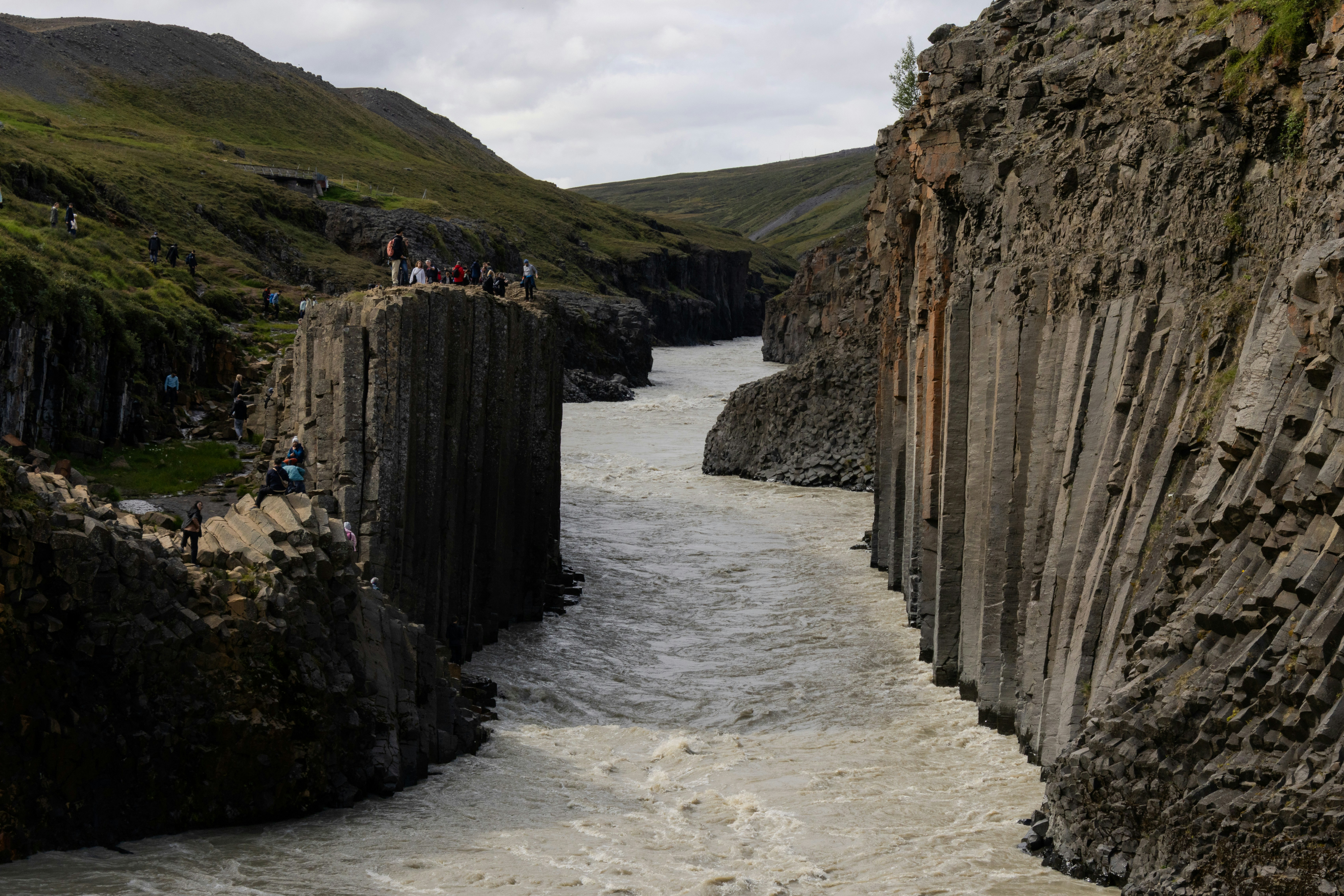 River Through the Hexagonal Basalt Gorge: A Narrow Passage in Motion