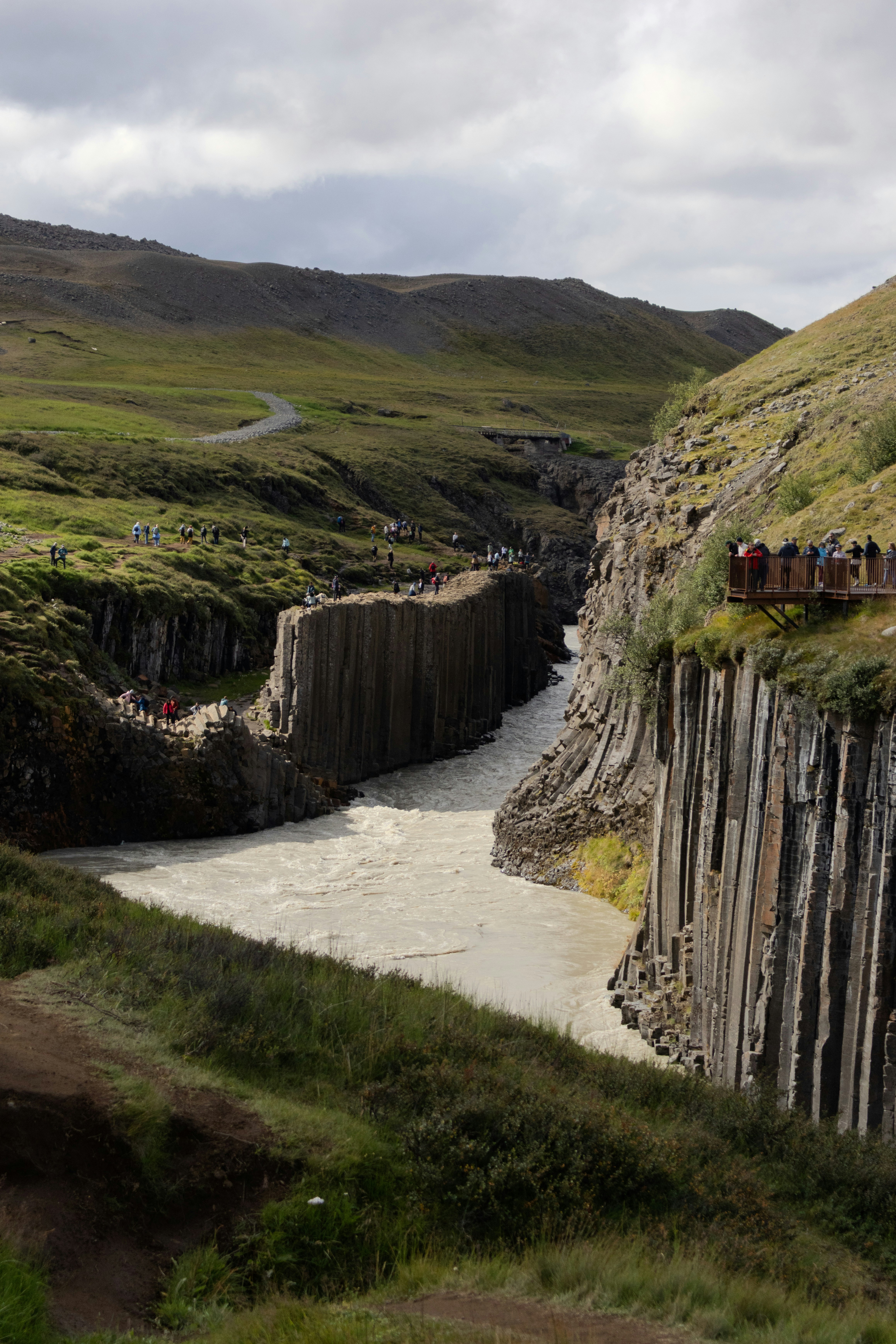 Rushing River Gorge: Visitors on the Edge of Basalt Columns