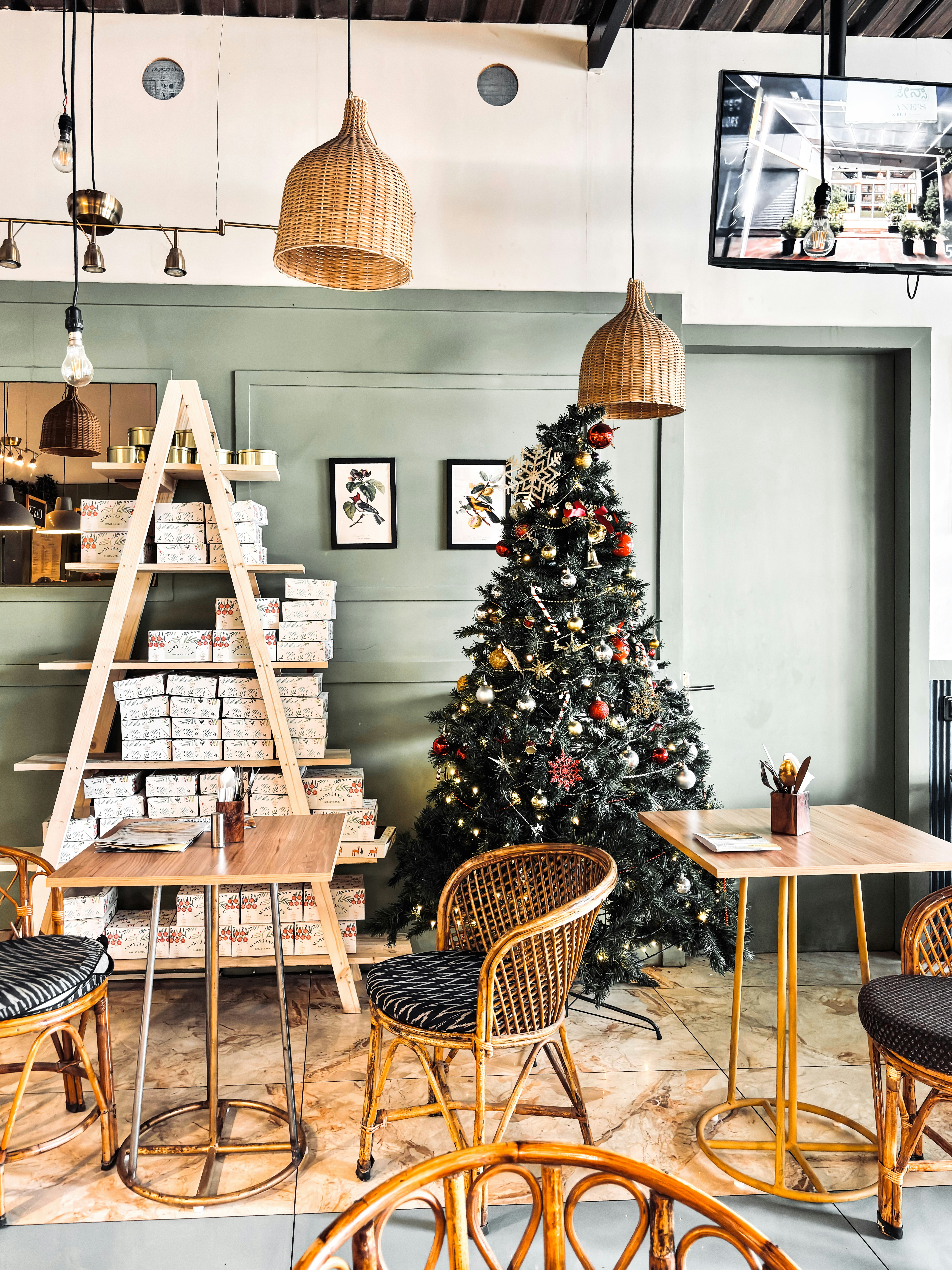 Cozy Christmas Corner: A Welcoming Café Scene with a Festive Tree