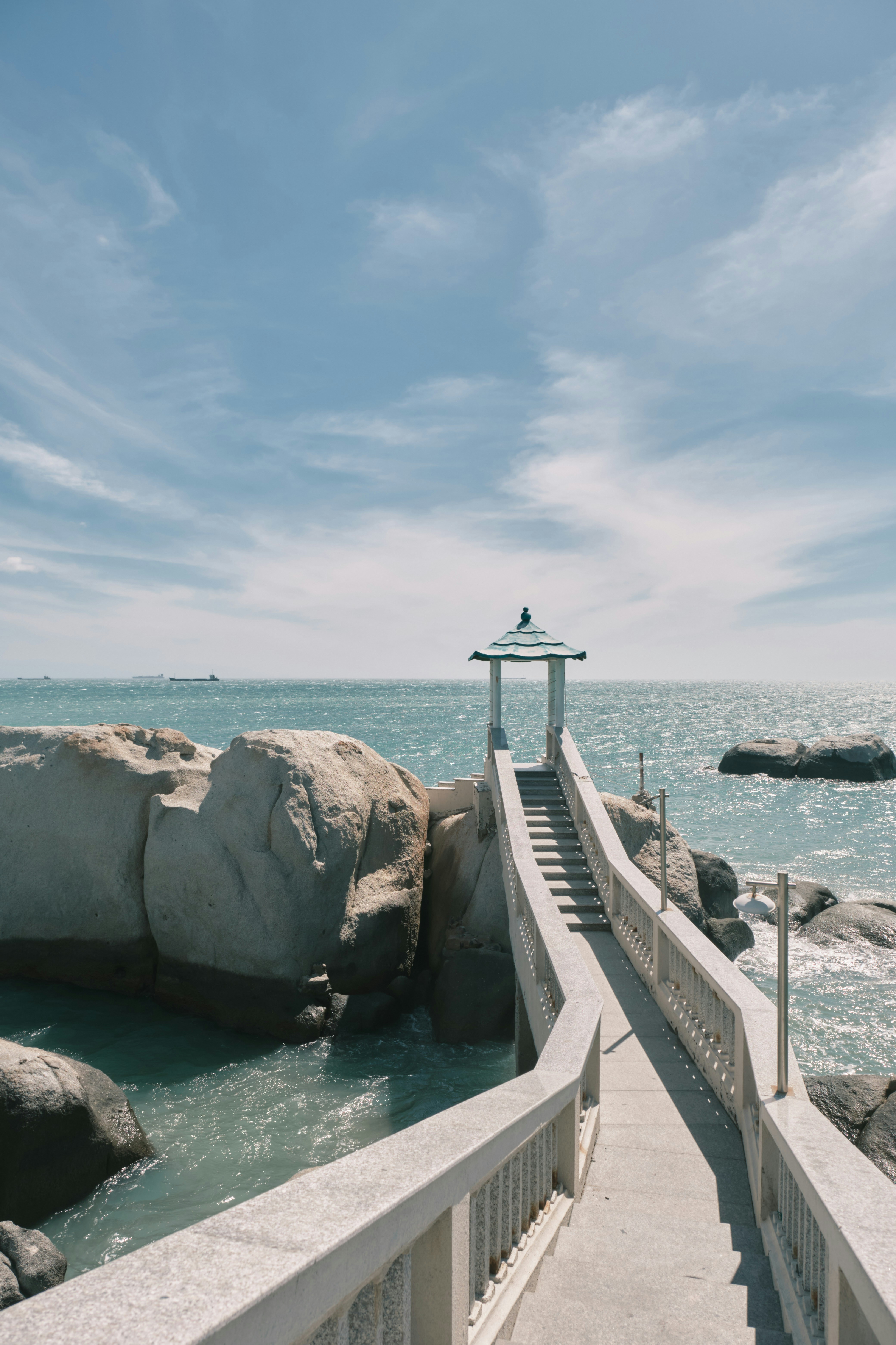 Gateway to the Sea: A Stone Bridge Reaches the Horizon