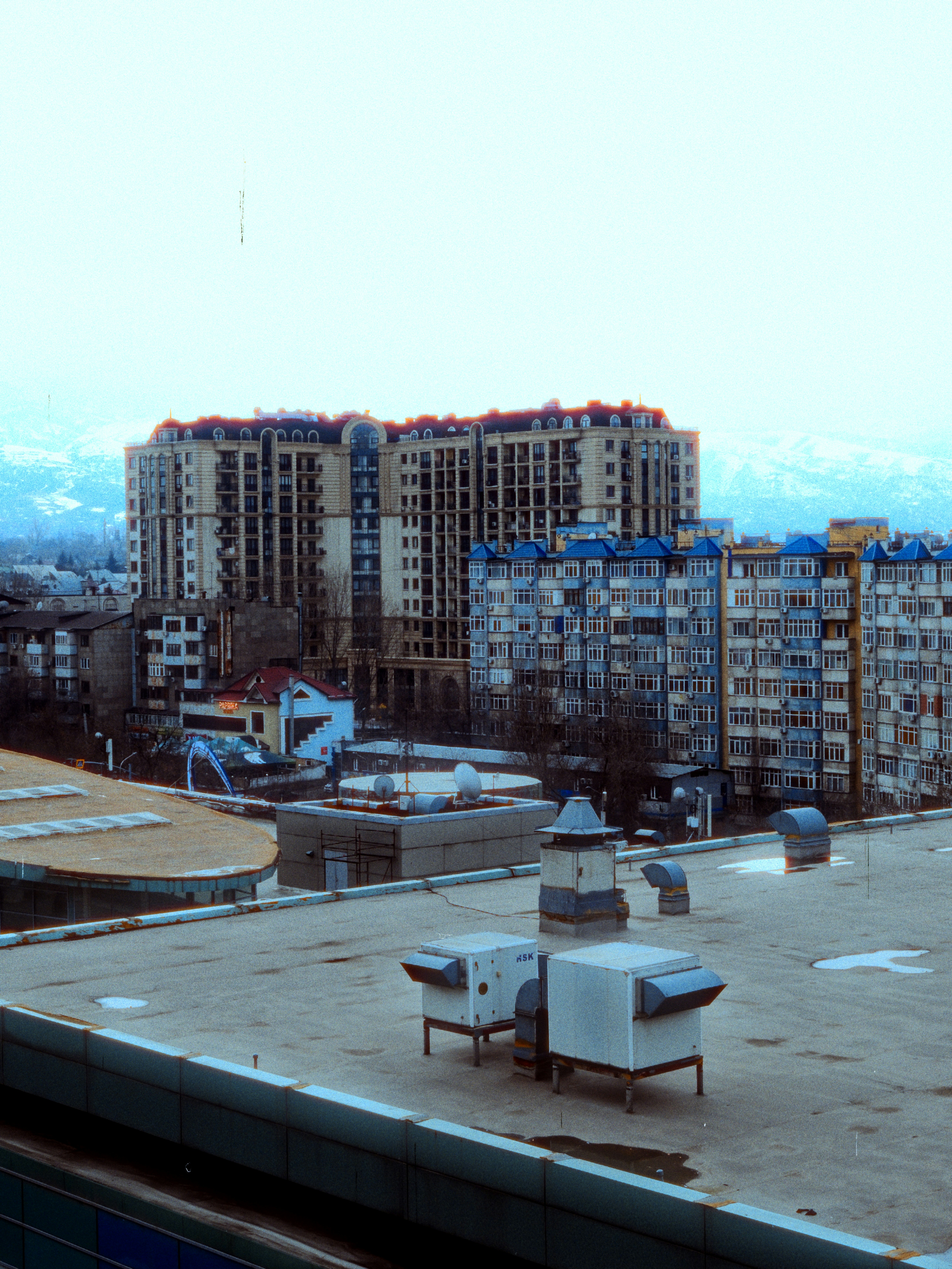Rooftop Vista over a Geometric Cityscape