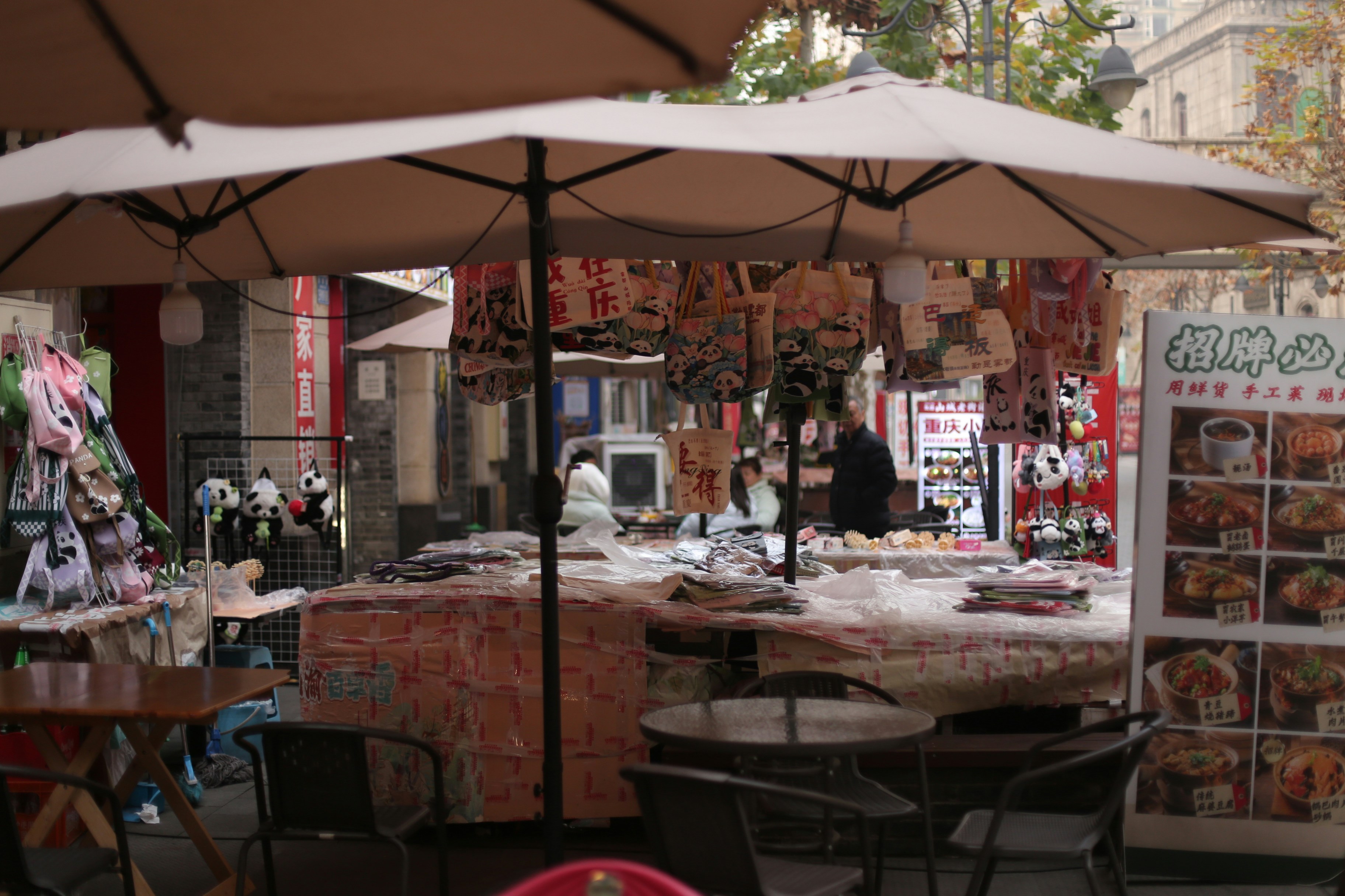 Stall of Souvenirs Under a Shared Canopy