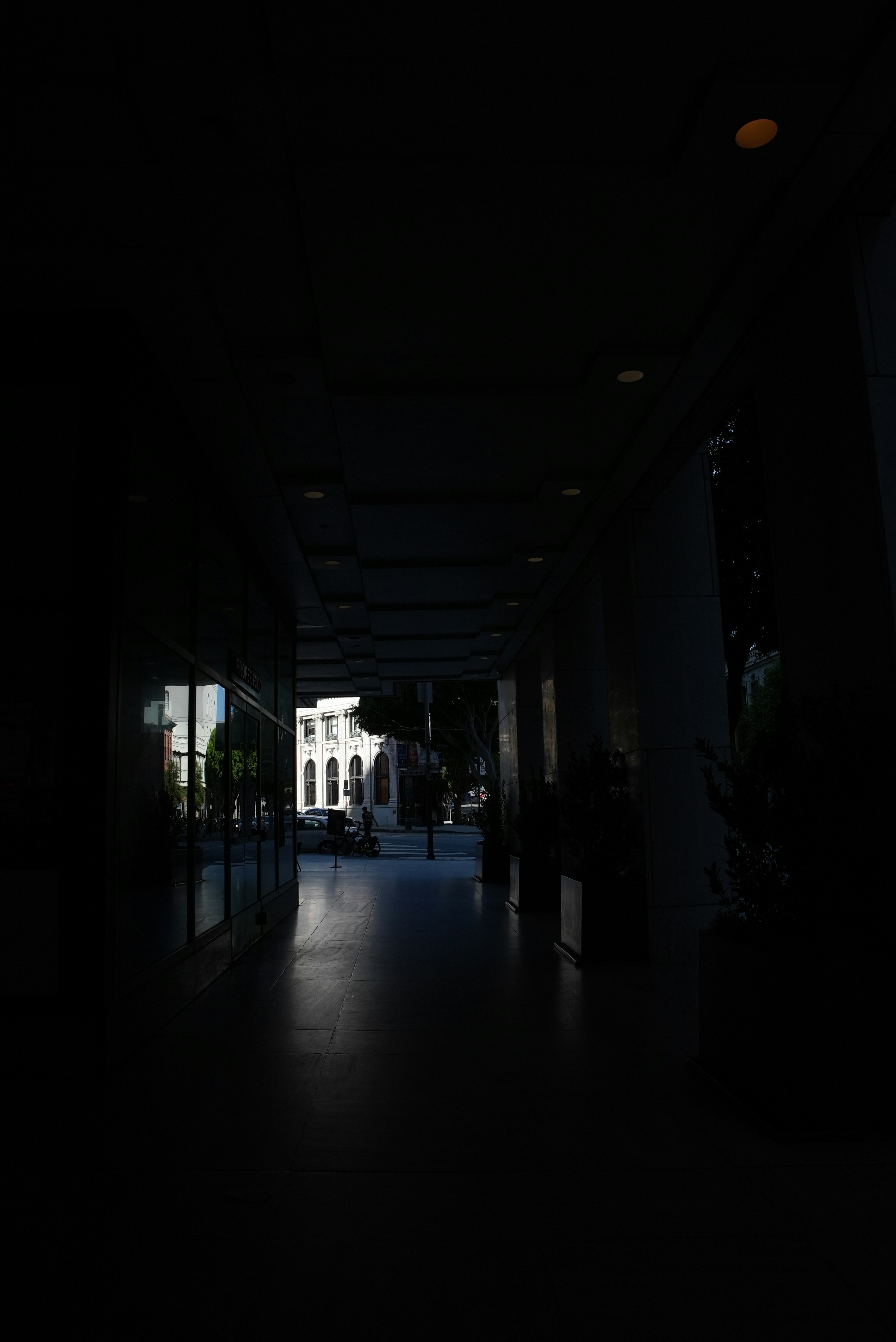Light at the End of a Shadowed Walkway