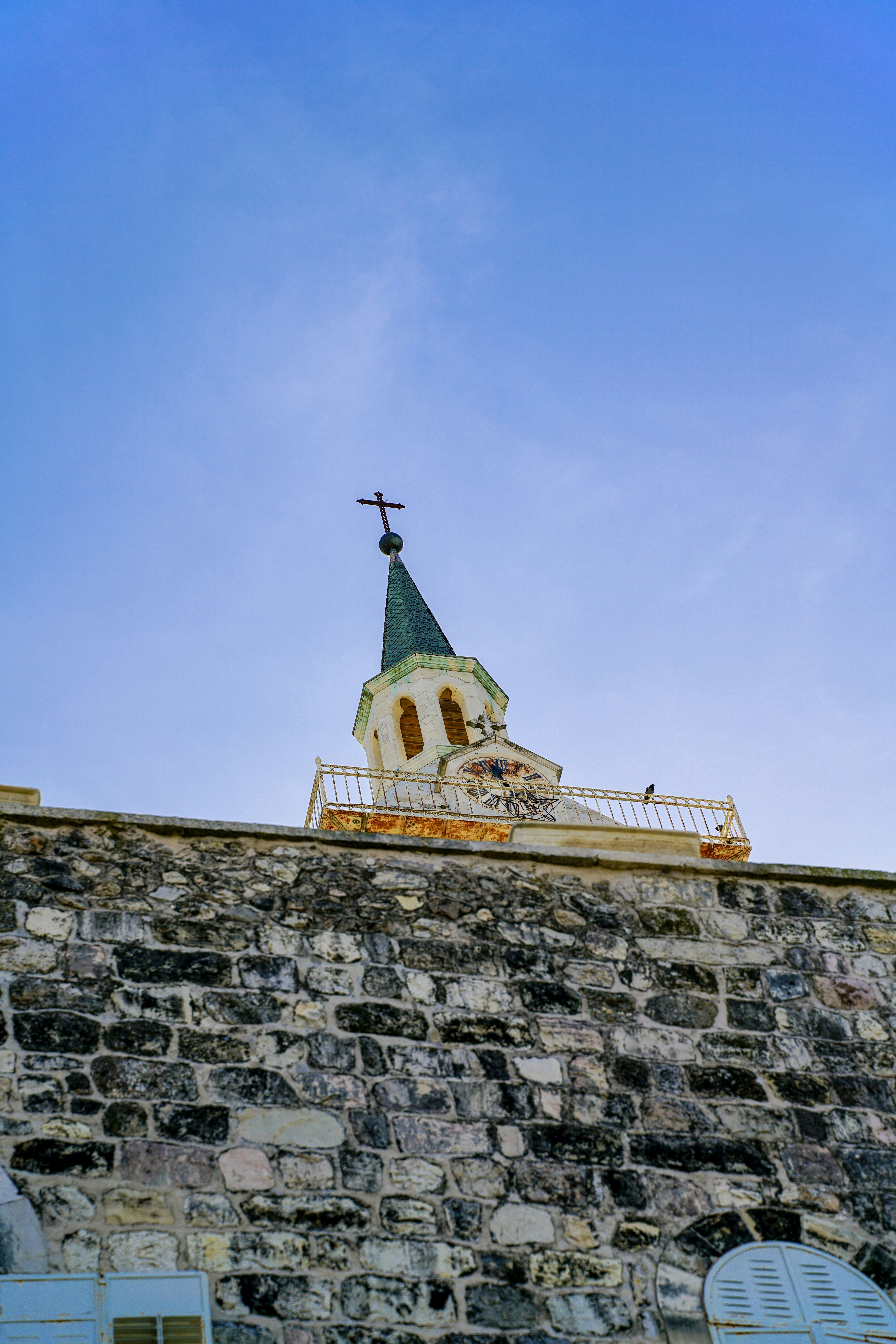 Bell Tower Crest: A Steady Sentinel Above the Stone Wall