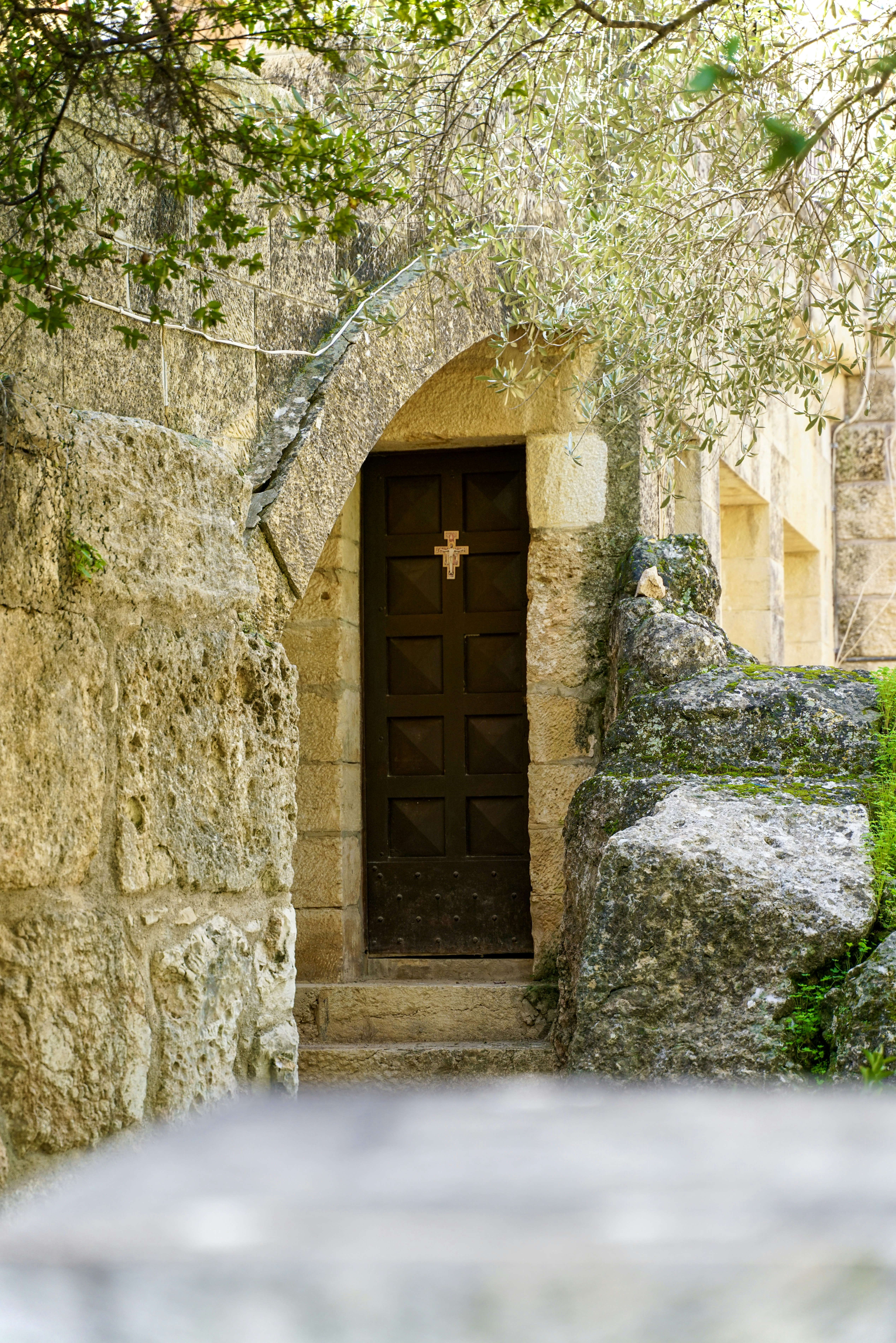 Hidden Doorway in Ancient Stone Archway