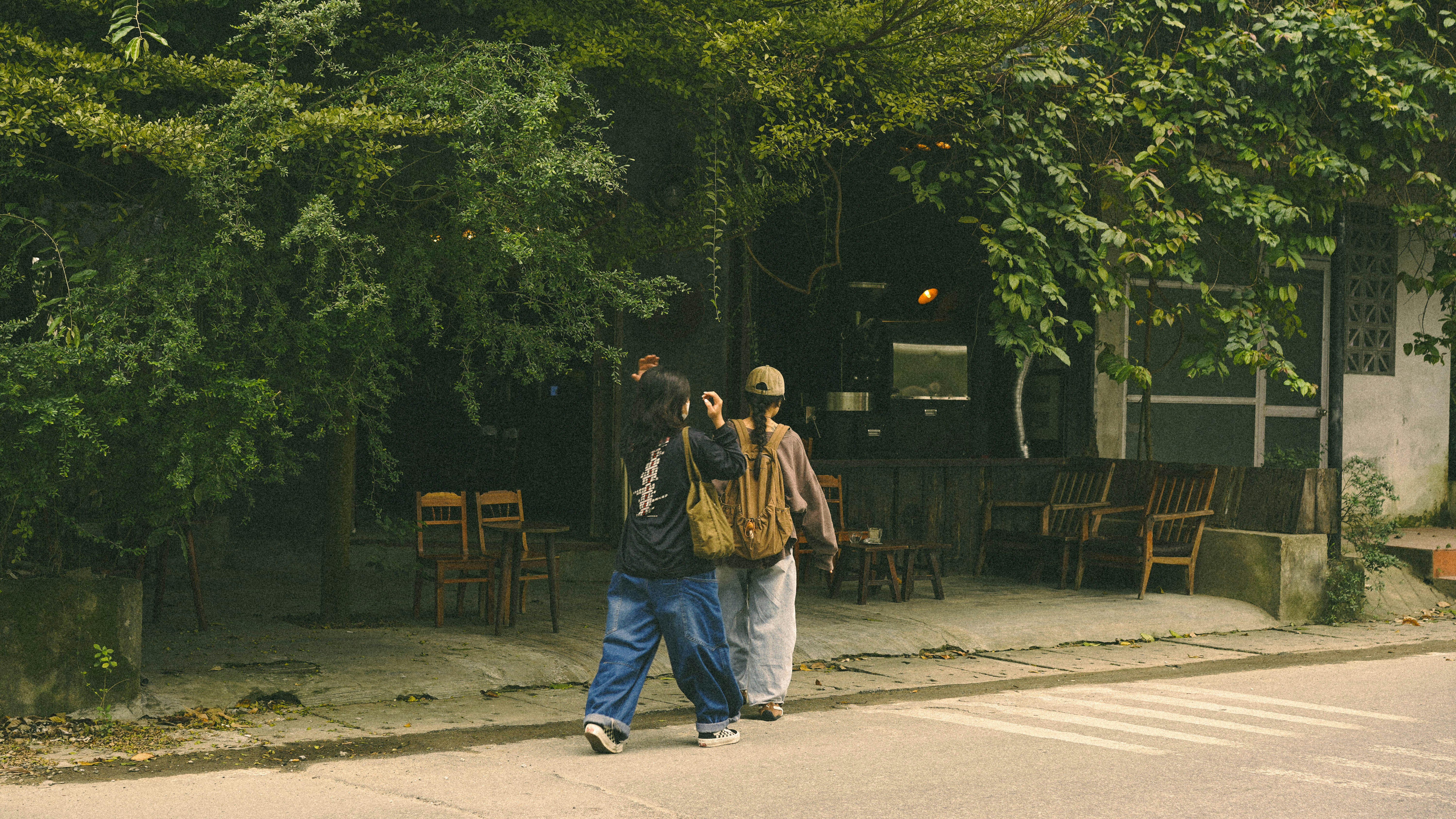 Quiet stride along a shaded street