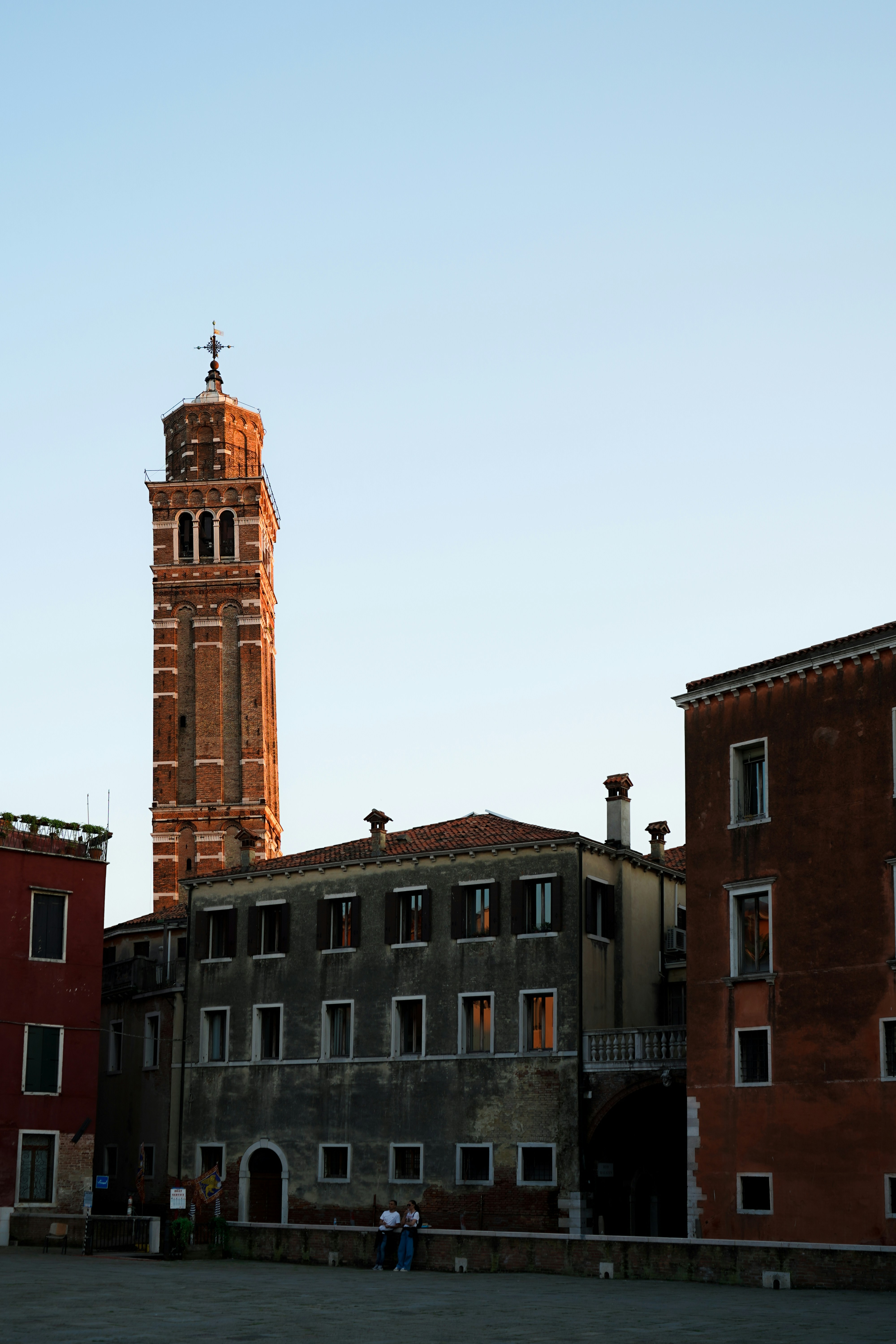 Clocktower Skyline: A Quiet Italian Square at Golden Hour