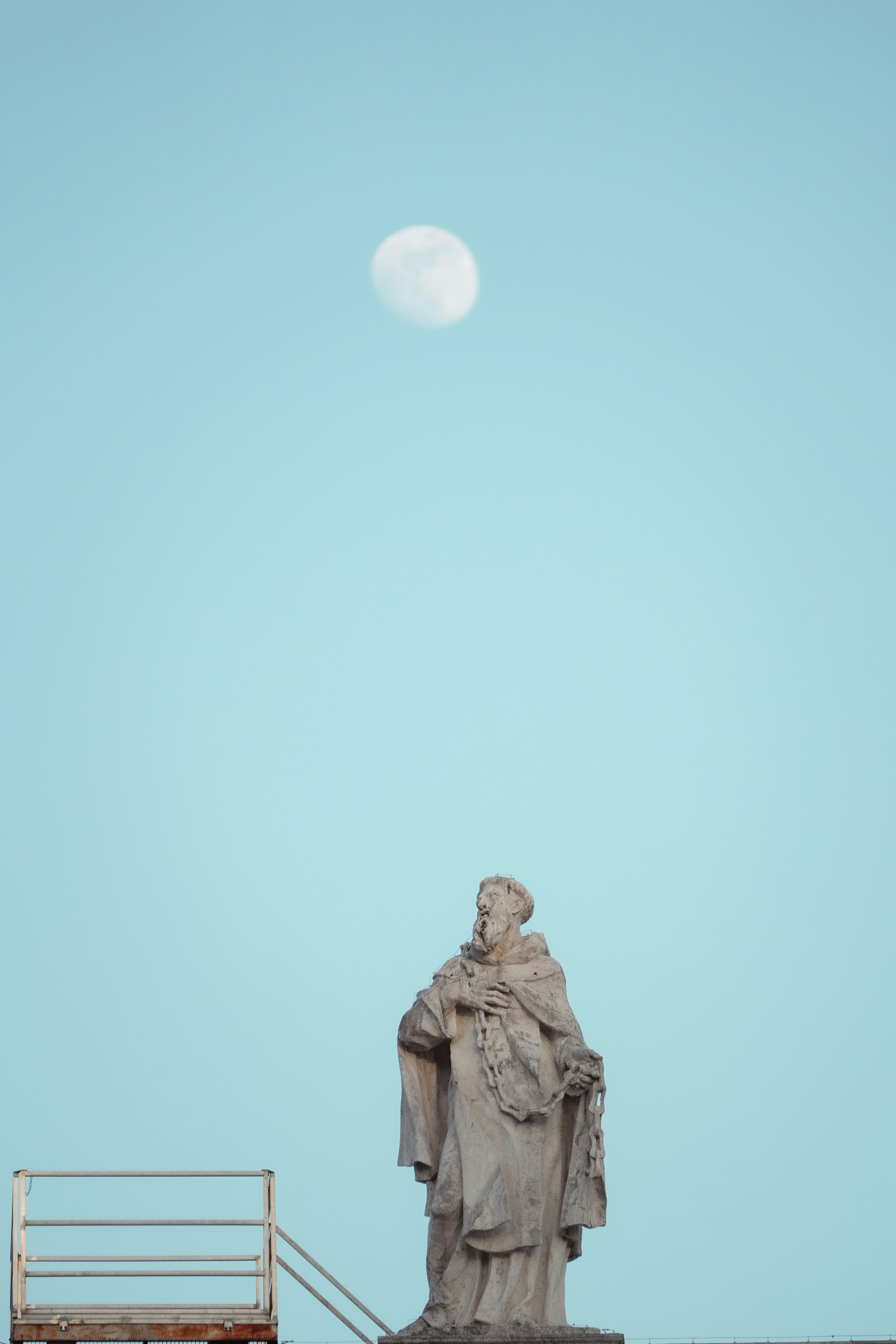 Stone Sentinel Beneath a Pallid Moon