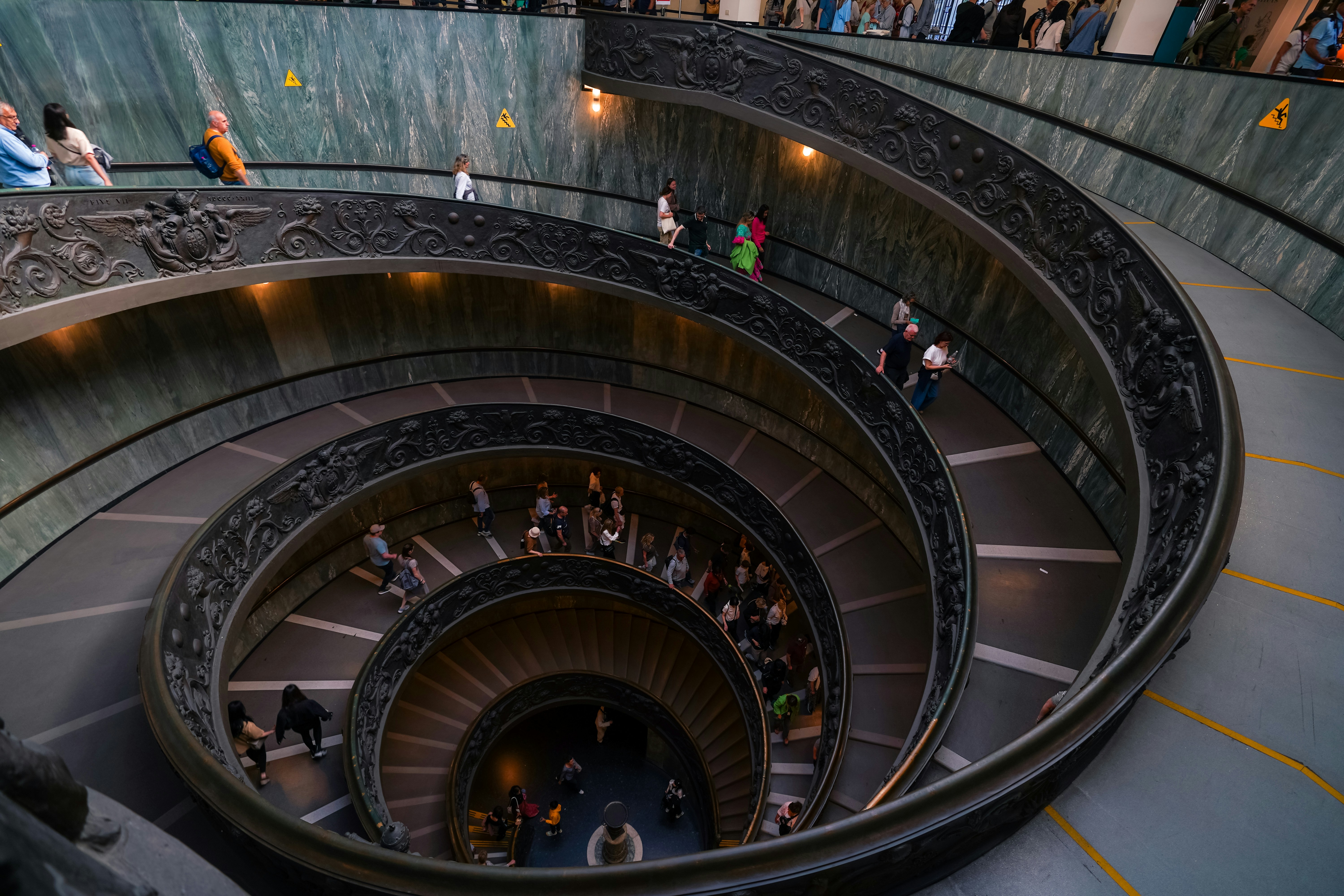 Spiral Staircase Through Light and Shadow