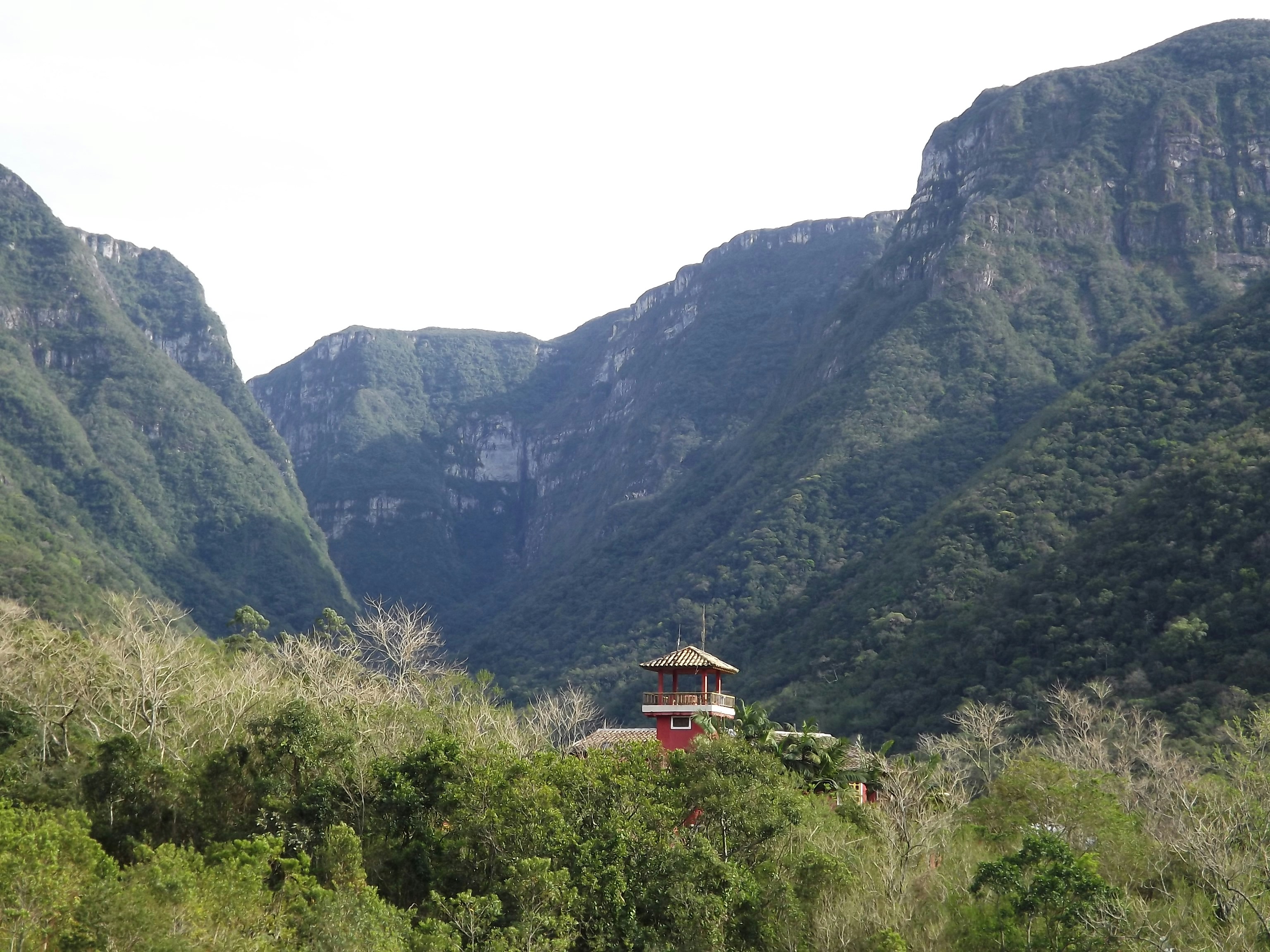 Temple Terrace: A Red Pagoda Nestled Between Verdant Valleys