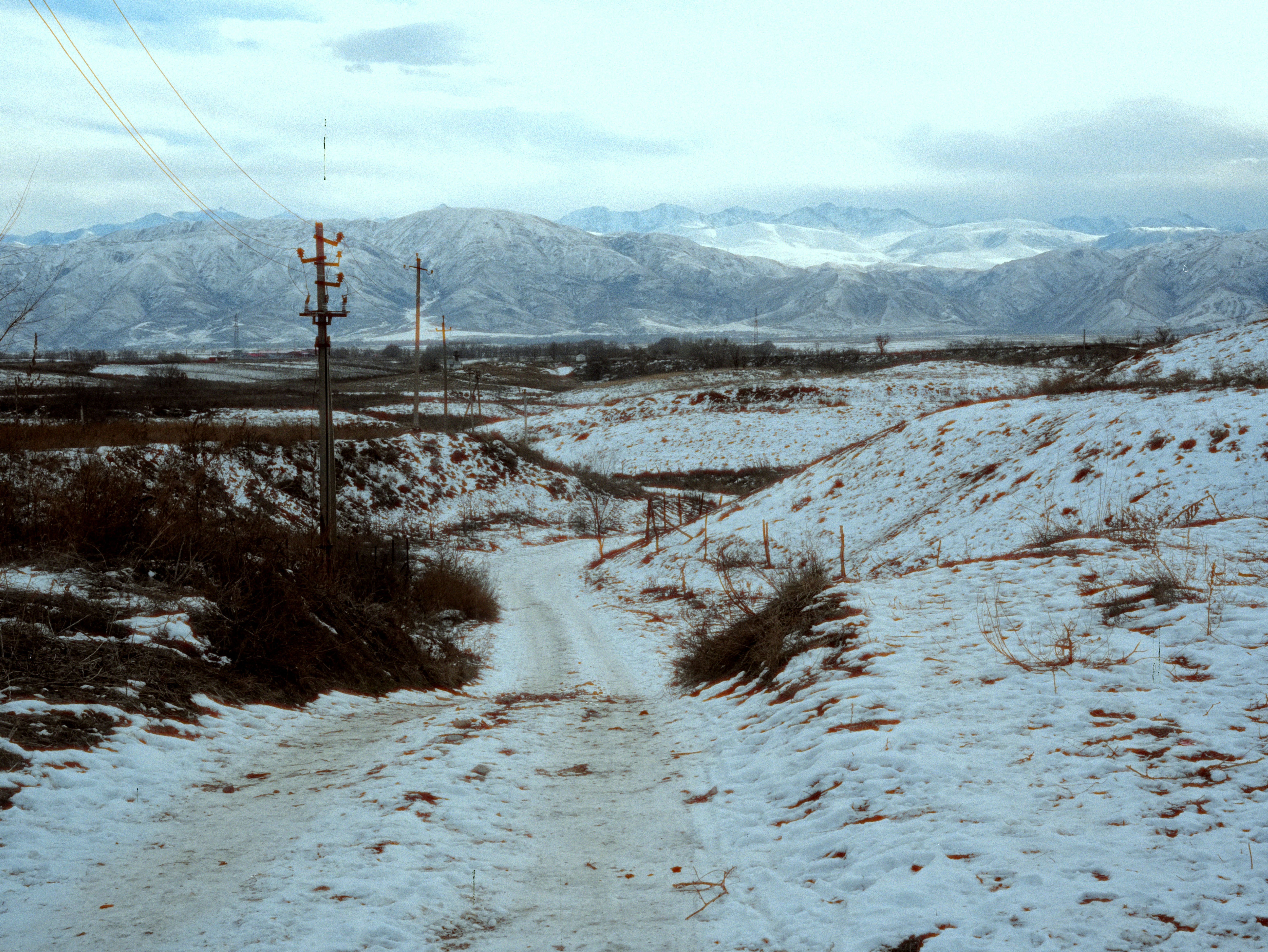 Snowbound Road to Distant Ridges
