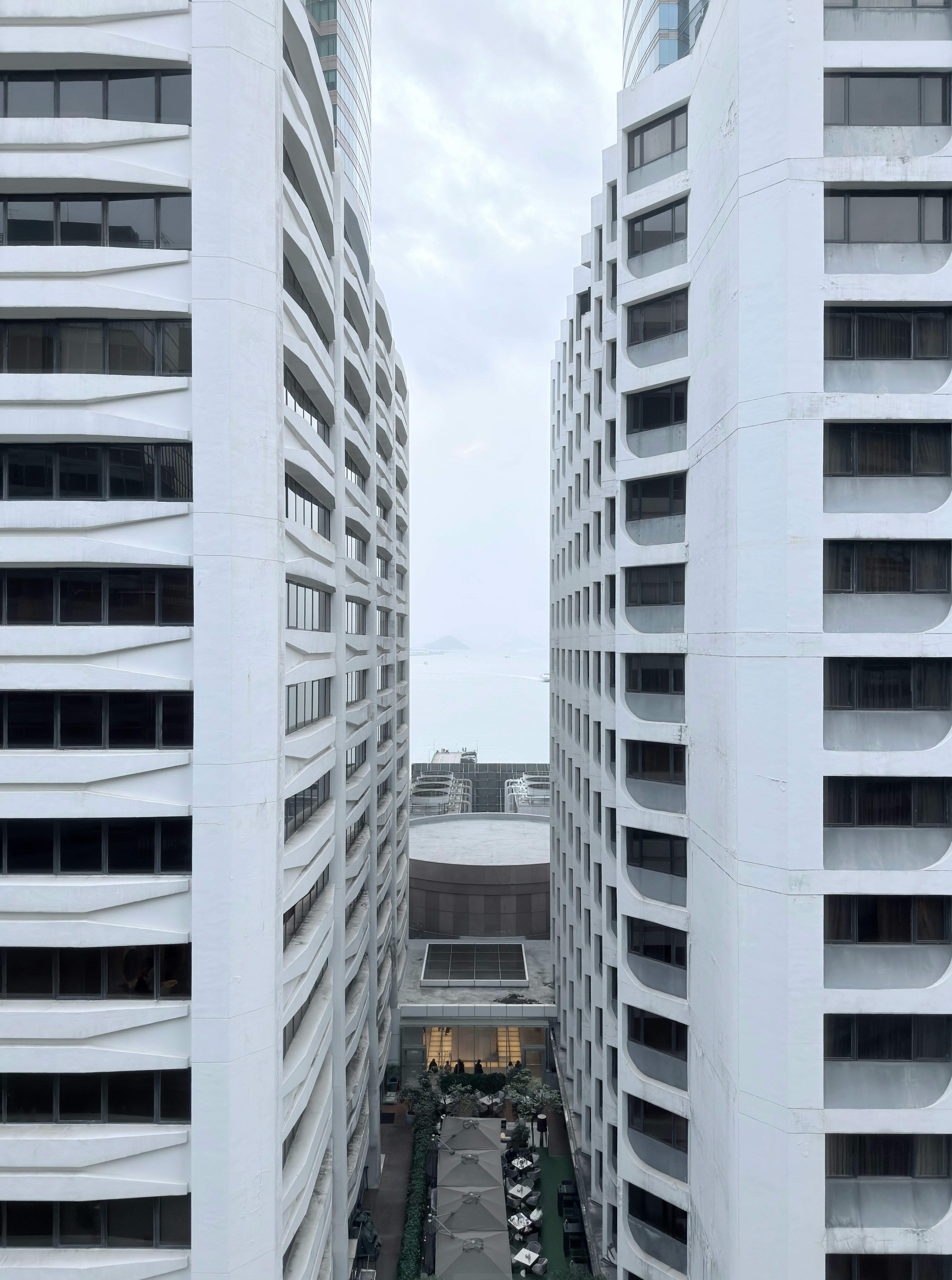 Twin Skybridges: A Narrow Corridor Between White Towers