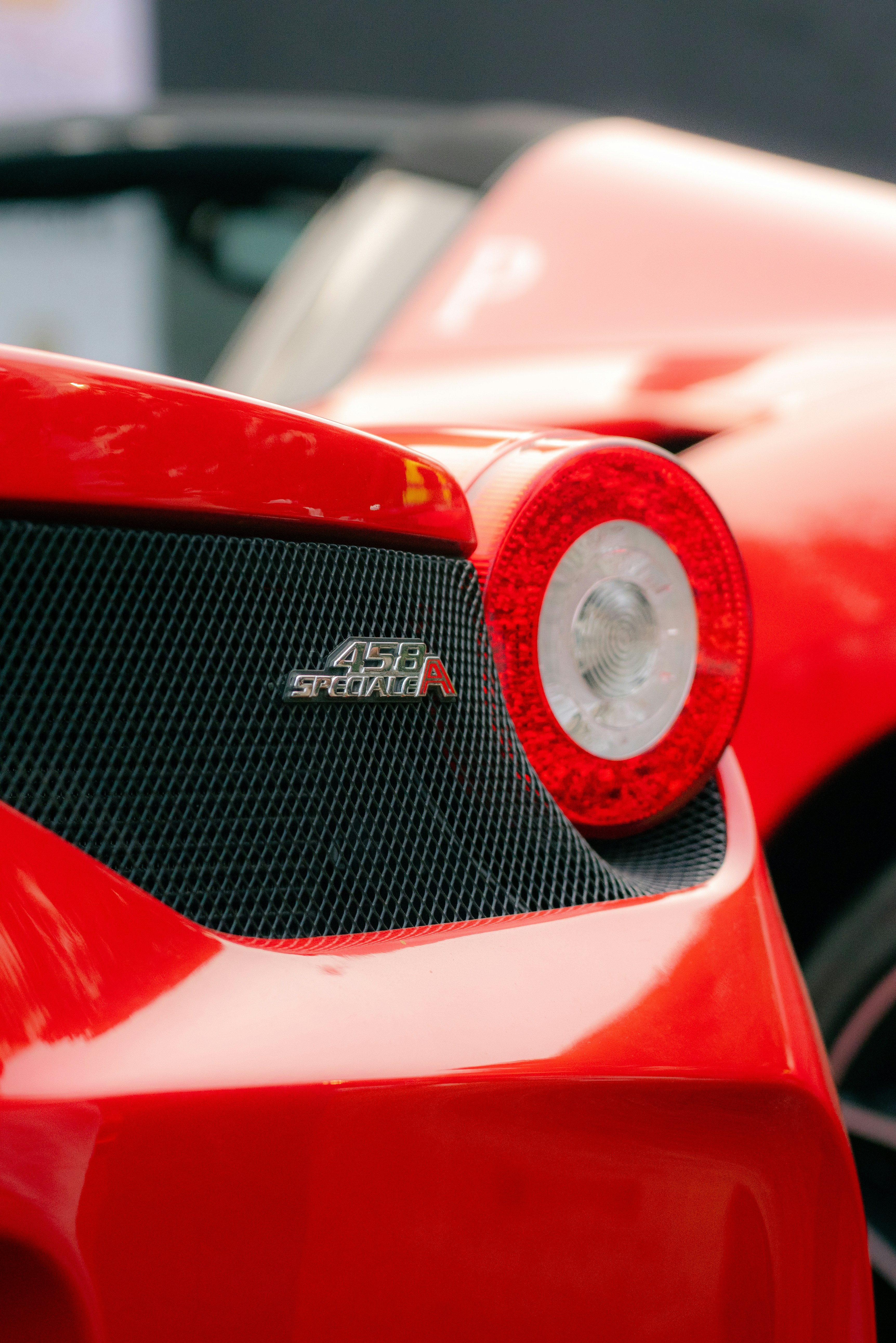 Rear Badge in Focus: The Heart of a Red Ferrari